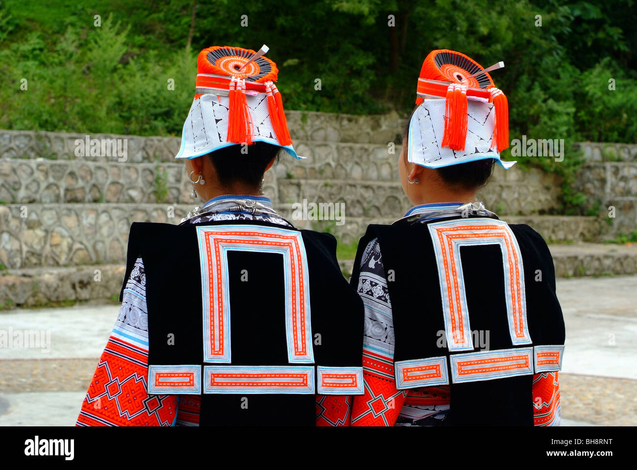 Back view of two women dressed in tradional clothing hi-res stock ...