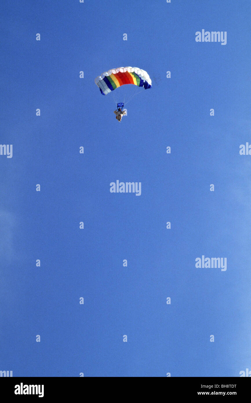skydiver parachute rainbow color sky fly glide Stock Photo - Alamy
