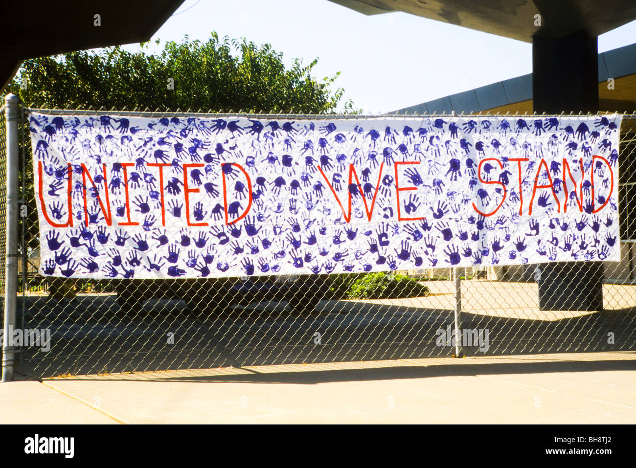 United We Stand banner handprint sign support Stock Photo - Alamy