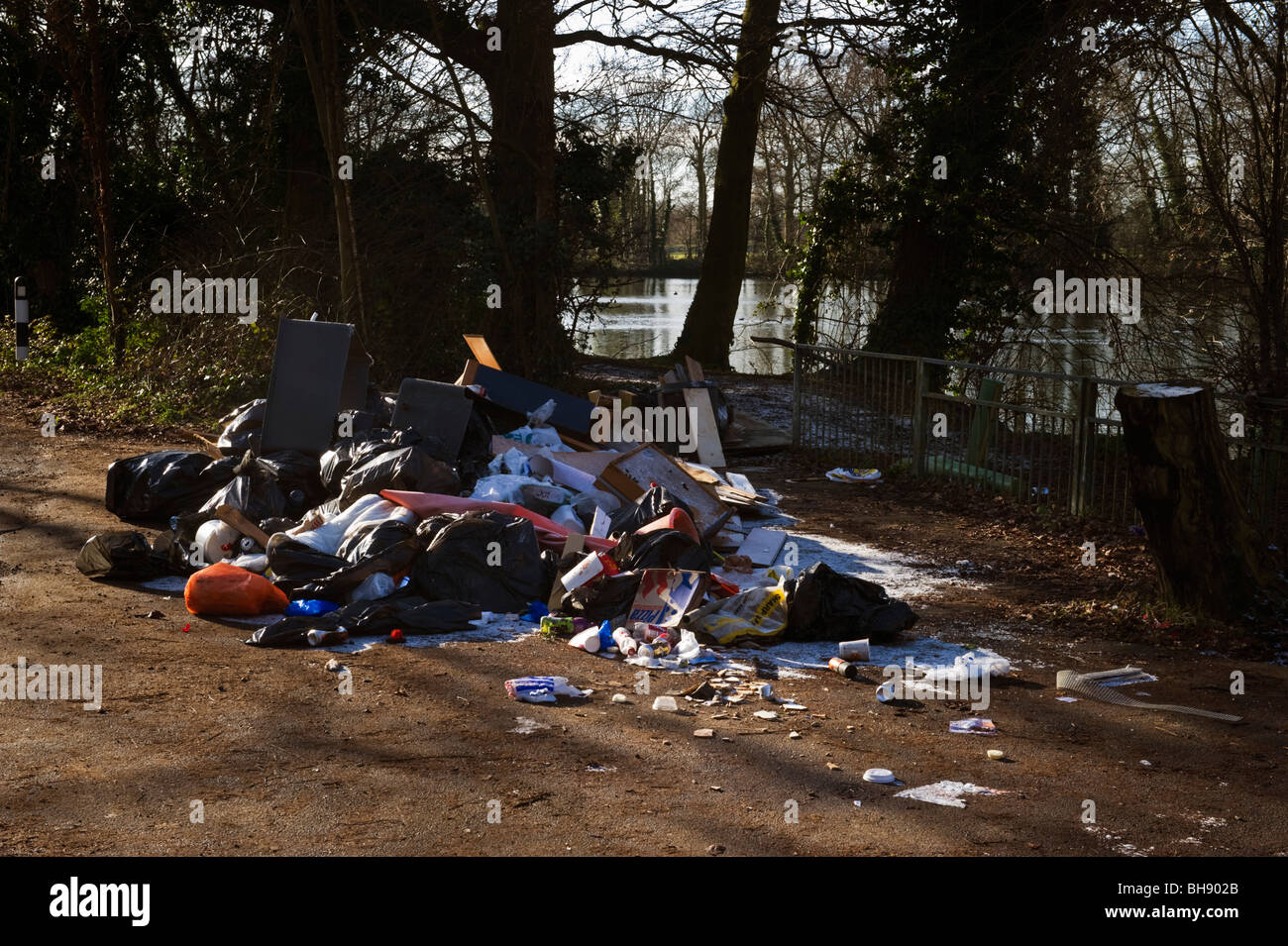 Litter, rubbish and debris, an unsightly mess dumped by the road at ...