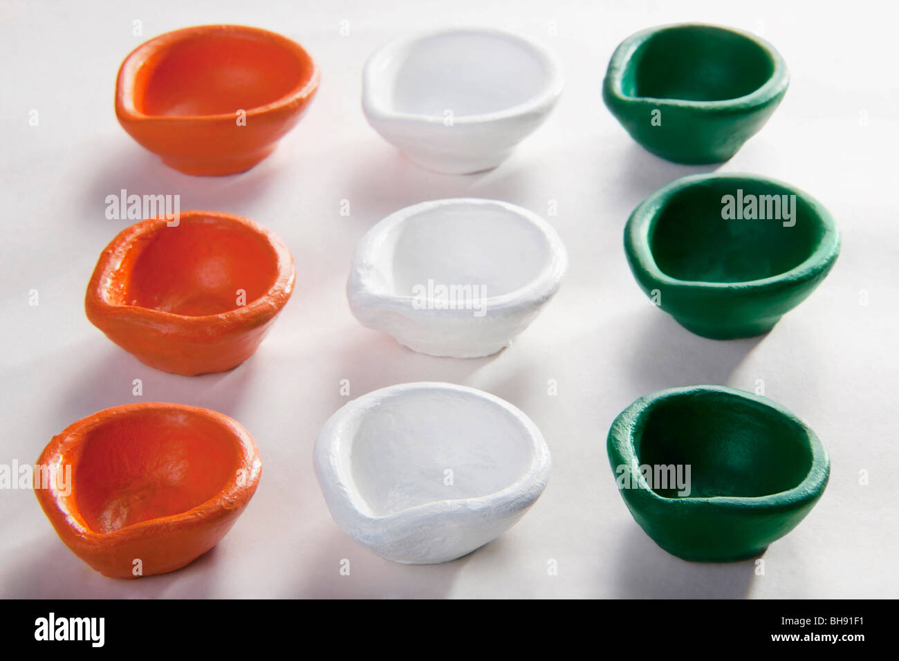 Different coloured diyas Stock Photo - Alamy