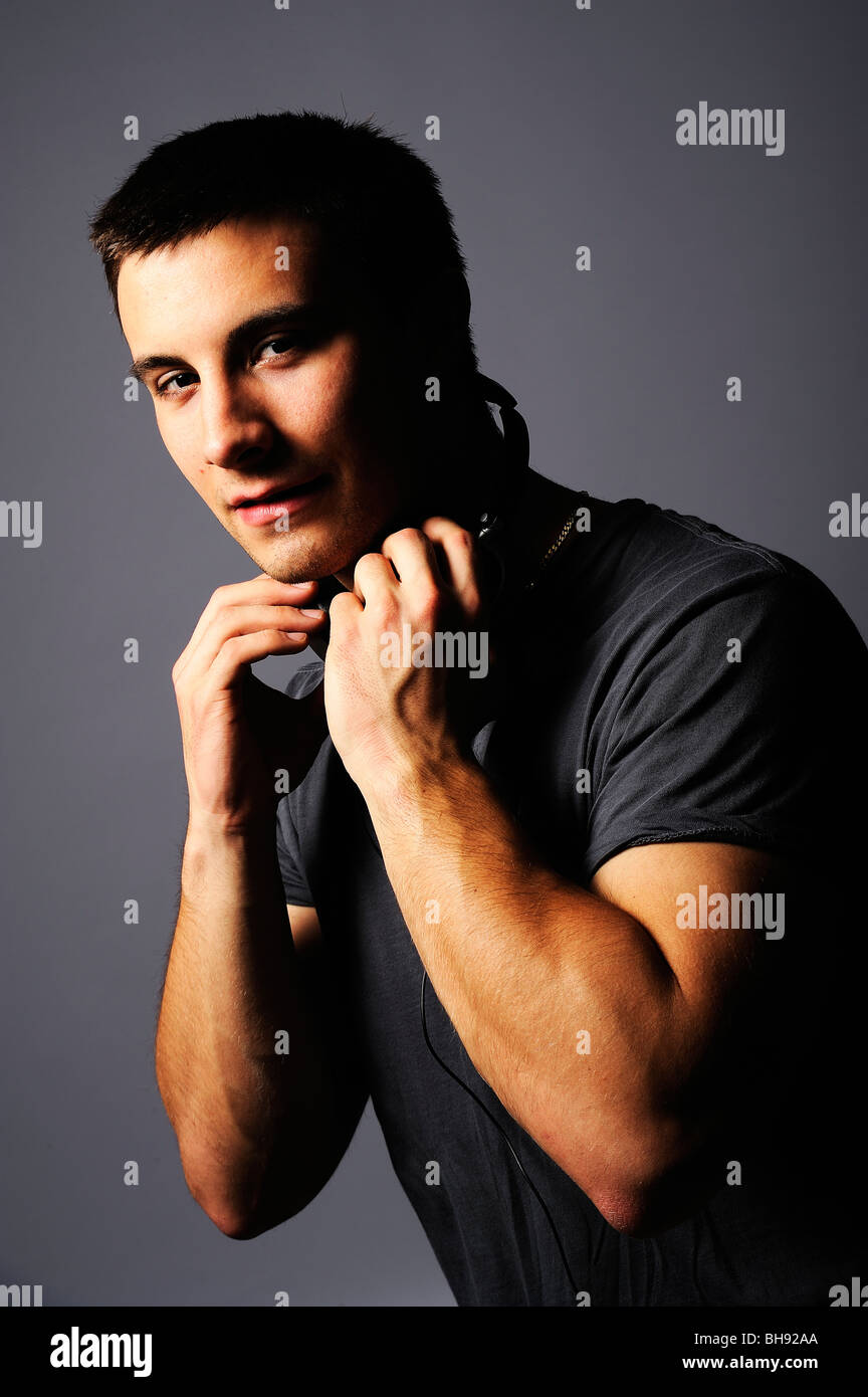 young male with head phones Stock Photo - Alamy