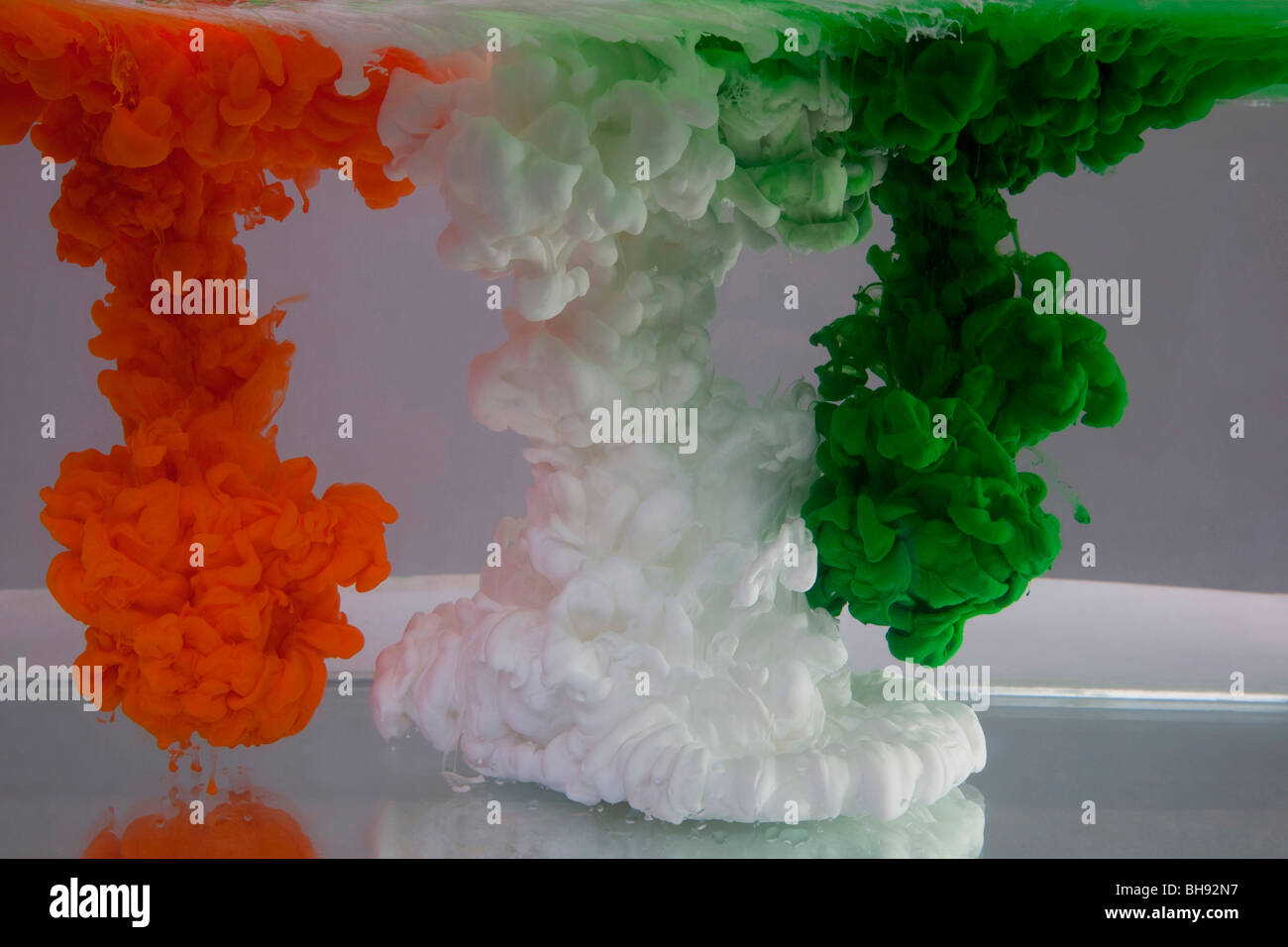 Paint dissolving in water Stock Photo - Alamy