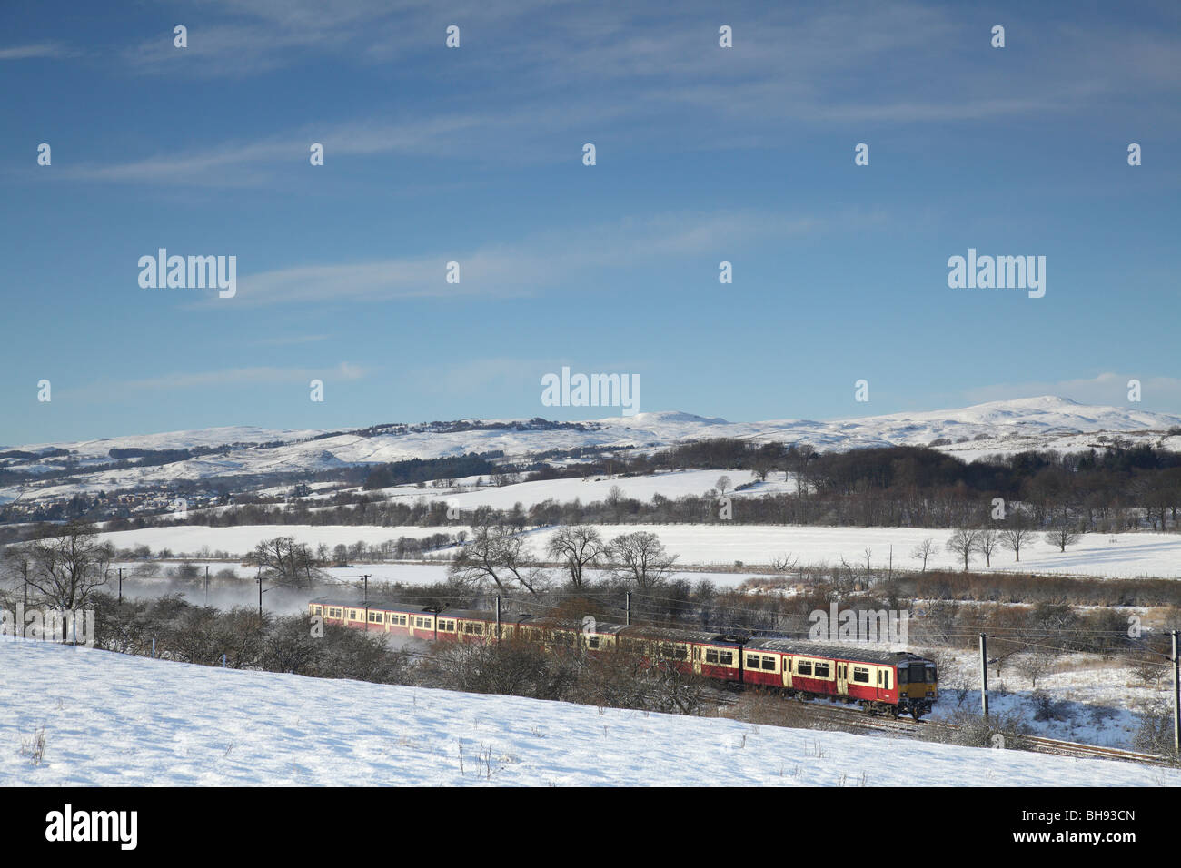 Train in winter snow, Scotland, UK Stock Photo - Alamy