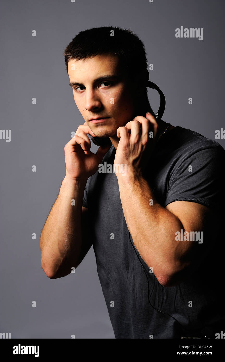 young male with head phones Stock Photo - Alamy