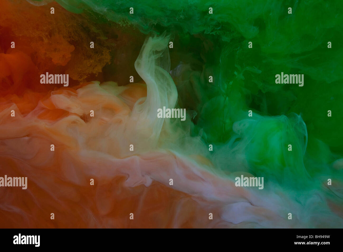 Paint dissolving in water Stock Photo - Alamy