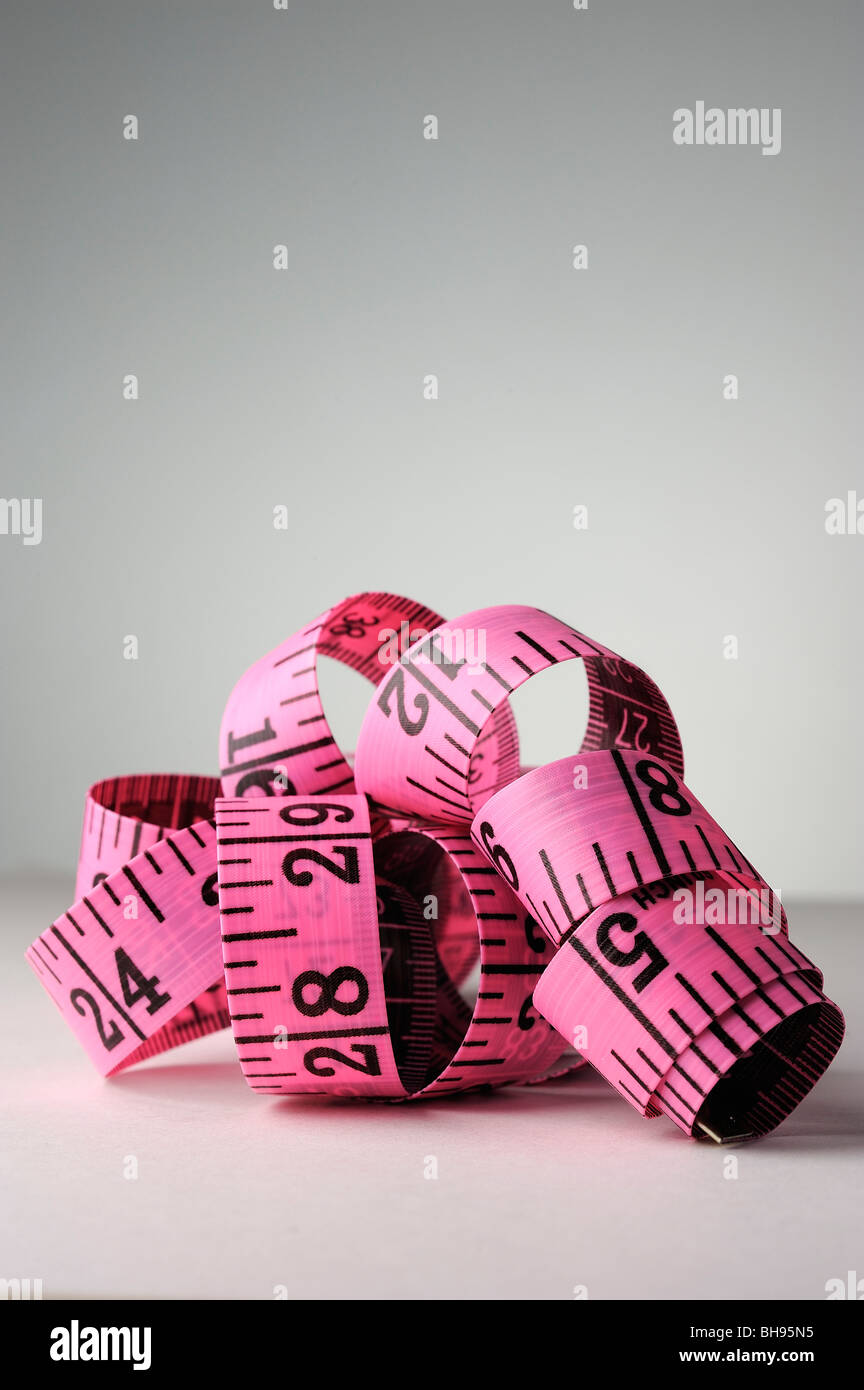 pink dress makers tape measure Stock Photo - Alamy