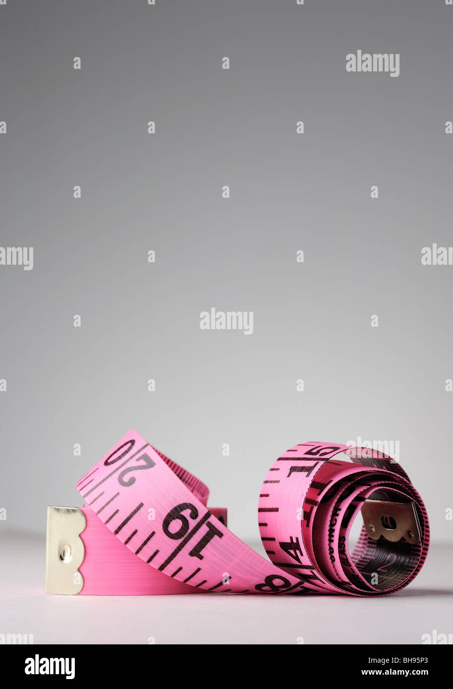 pink dress makers tape measure Stock Photo - Alamy