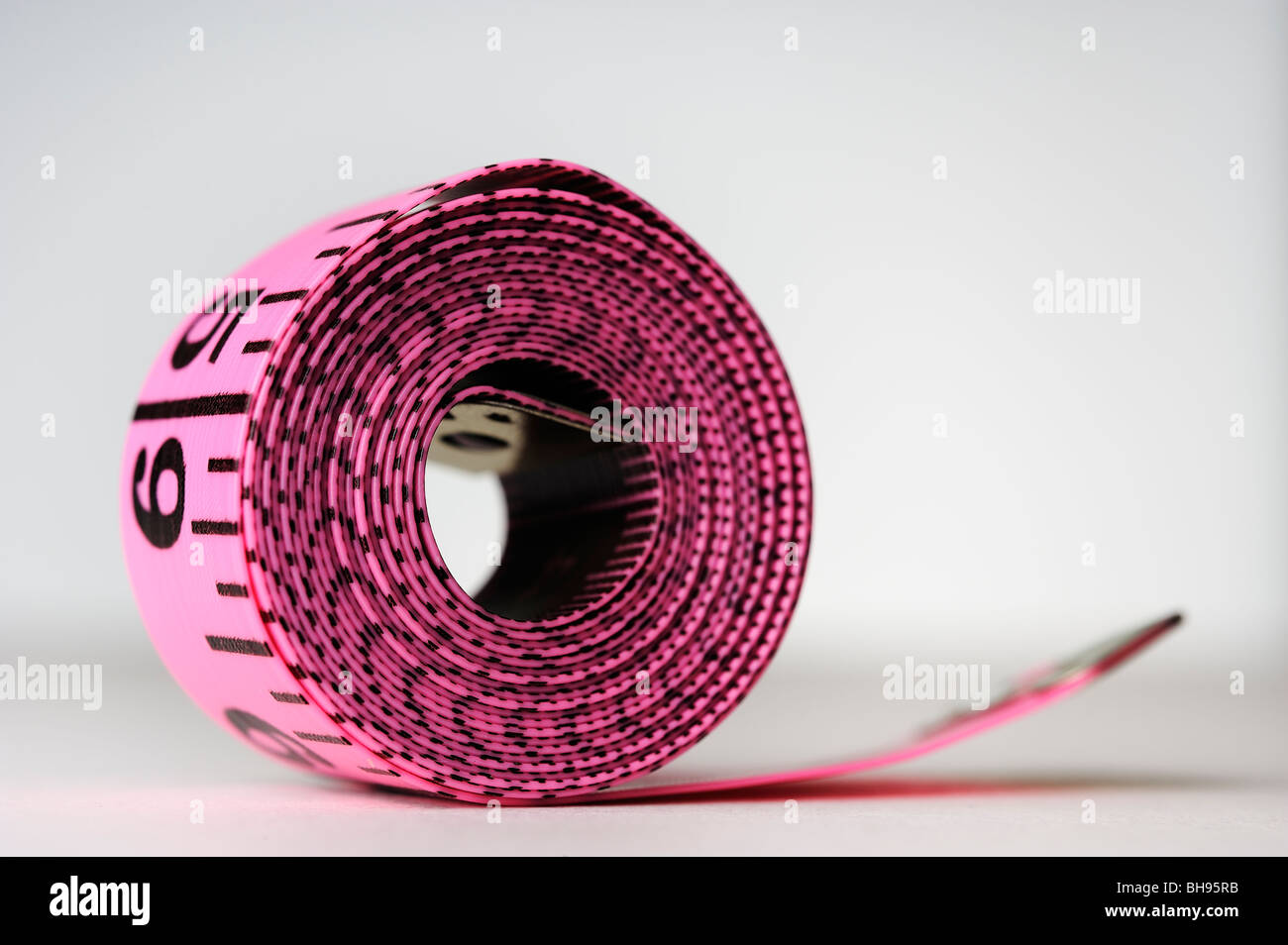 pink dress makers tape measure Stock Photo - Alamy