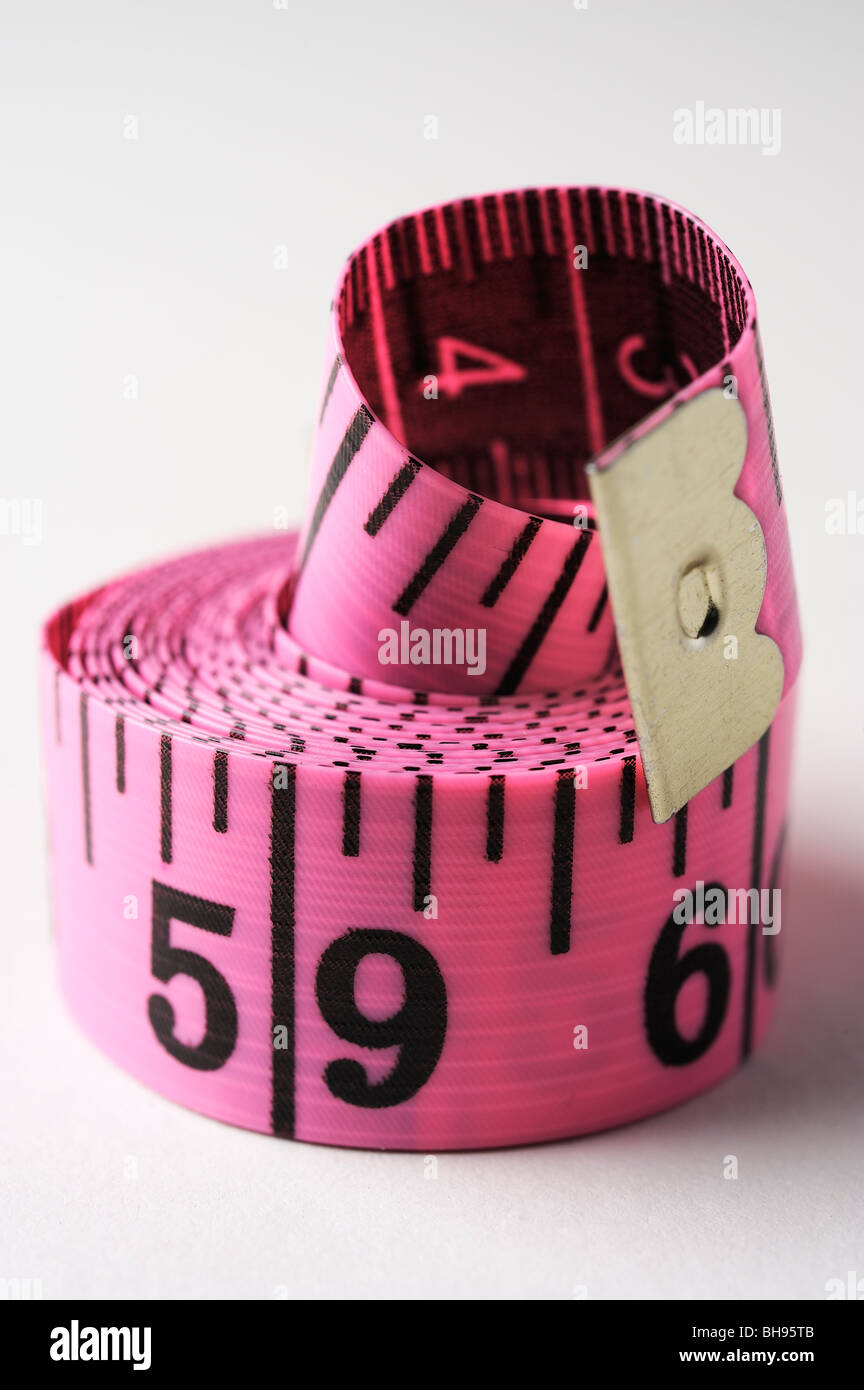 pink dress makers tape measure Stock Photo - Alamy