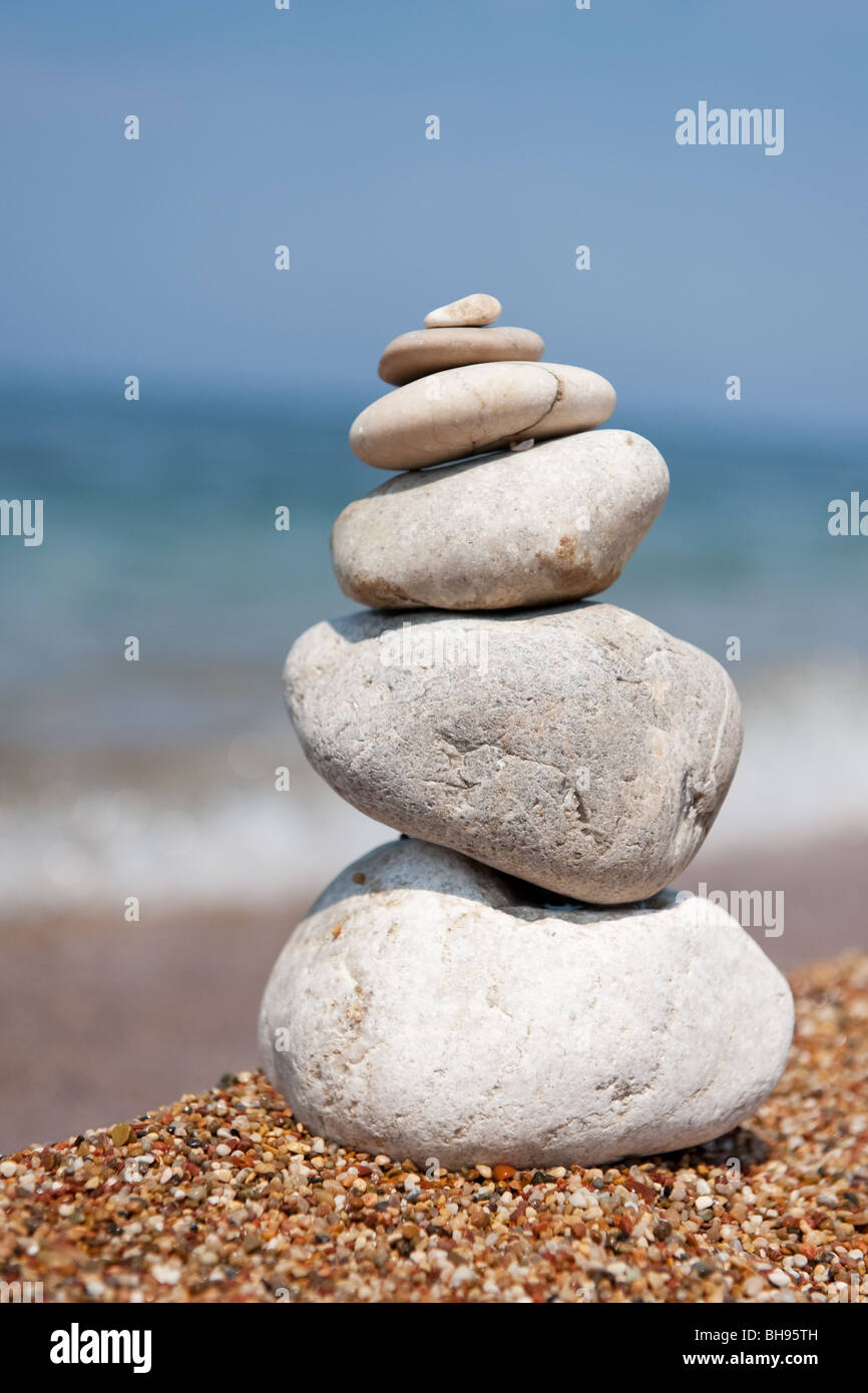 relax with stacked pebbles at the beach Stock Photo - Alamy