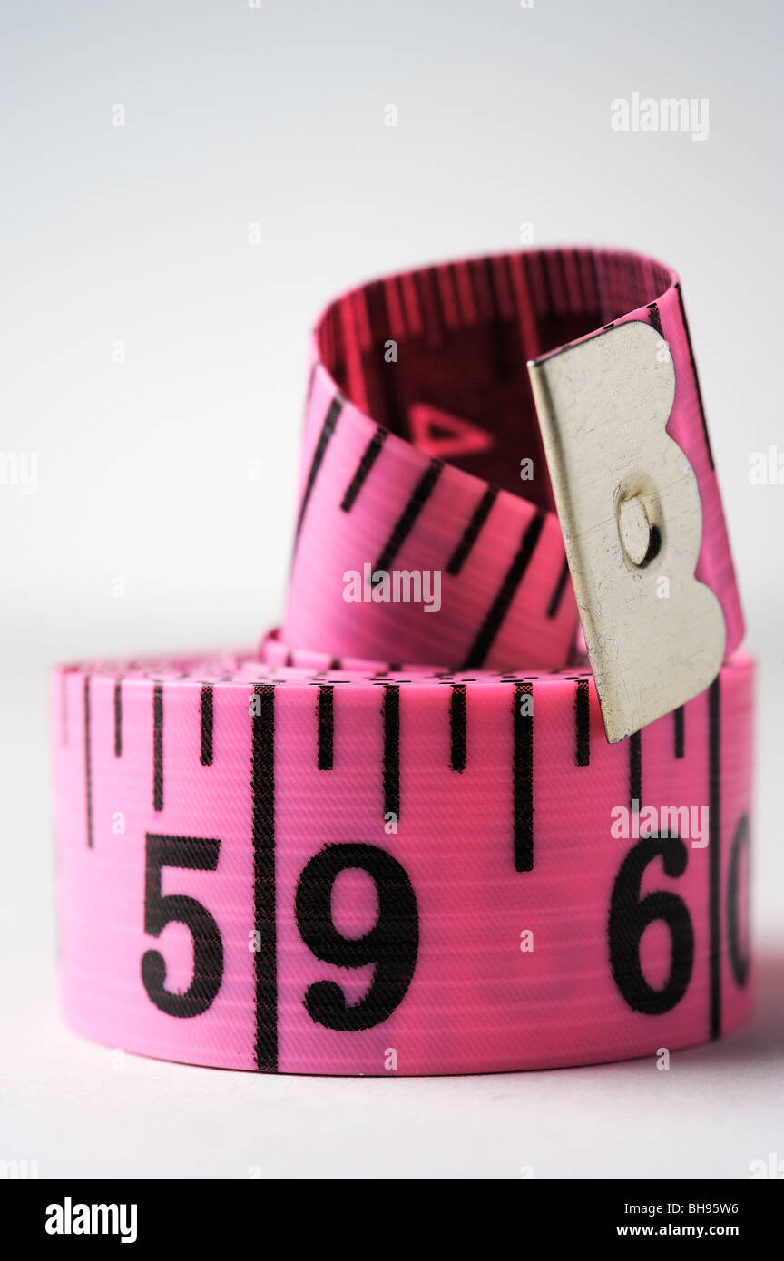pink dress makers tape measure Stock Photo - Alamy