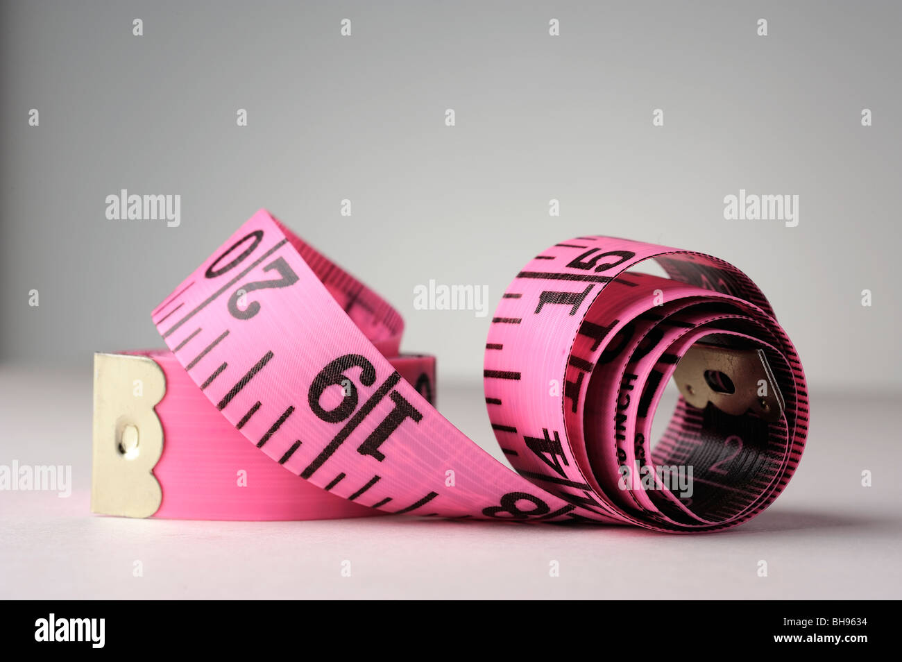 pink dress makers tape measure Stock Photo - Alamy