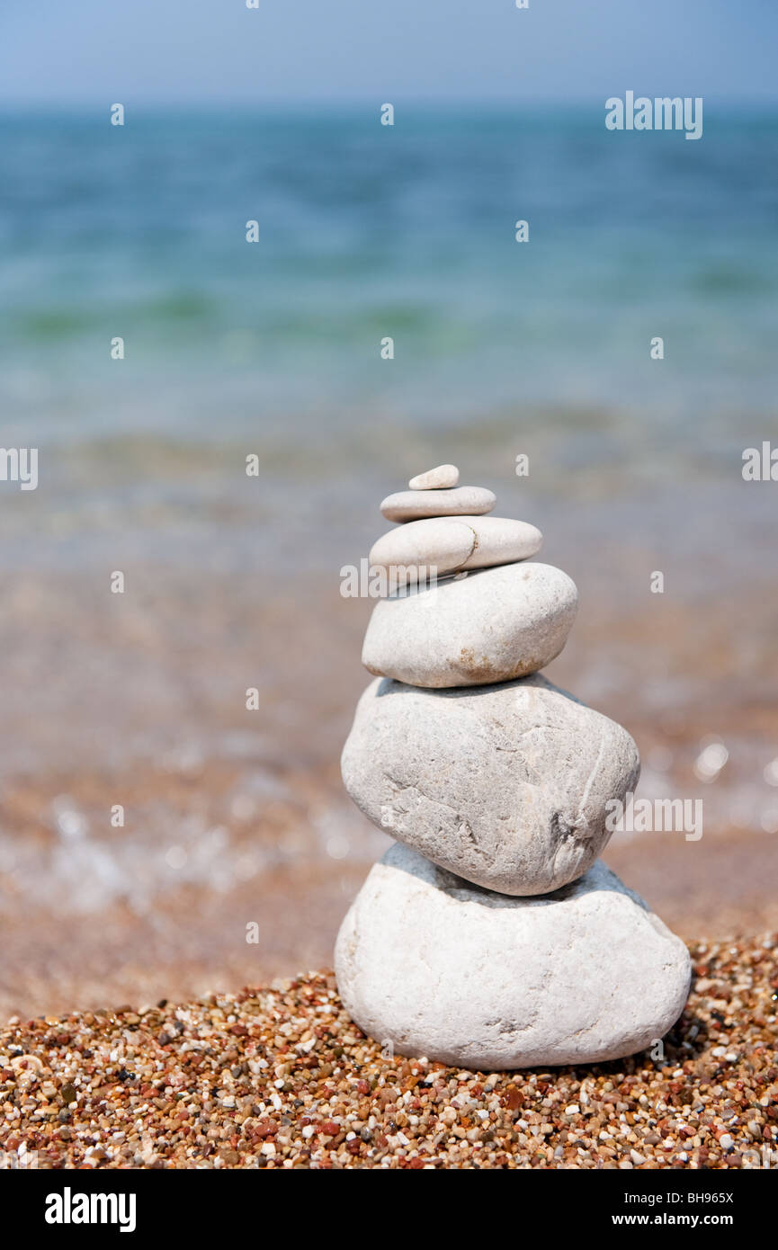 Stacked pebbles for rest and relaxing at the beach Stock Photo - Alamy