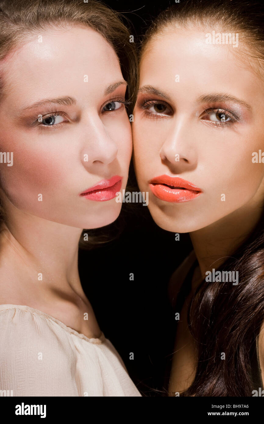 Two young women with red lips Stock Photo - Alamy