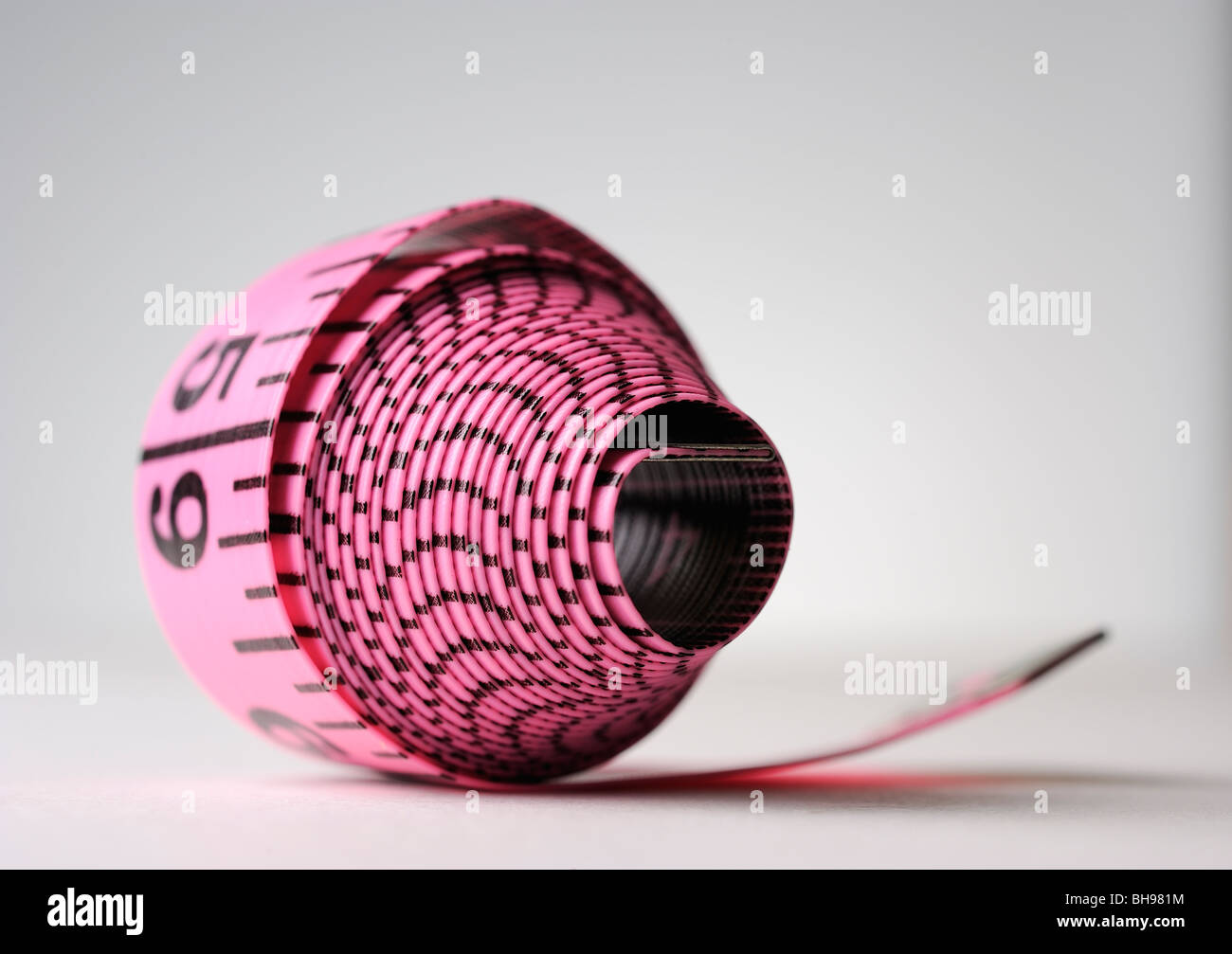 pink dress makers tape measure Stock Photo - Alamy