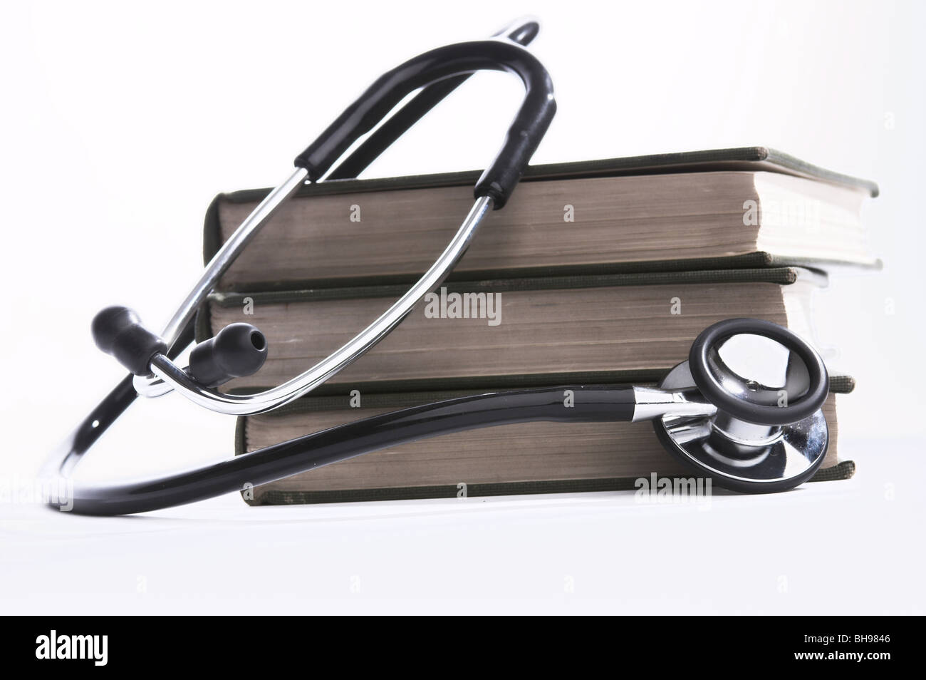 Stethoscope on books Stock Photo - Alamy