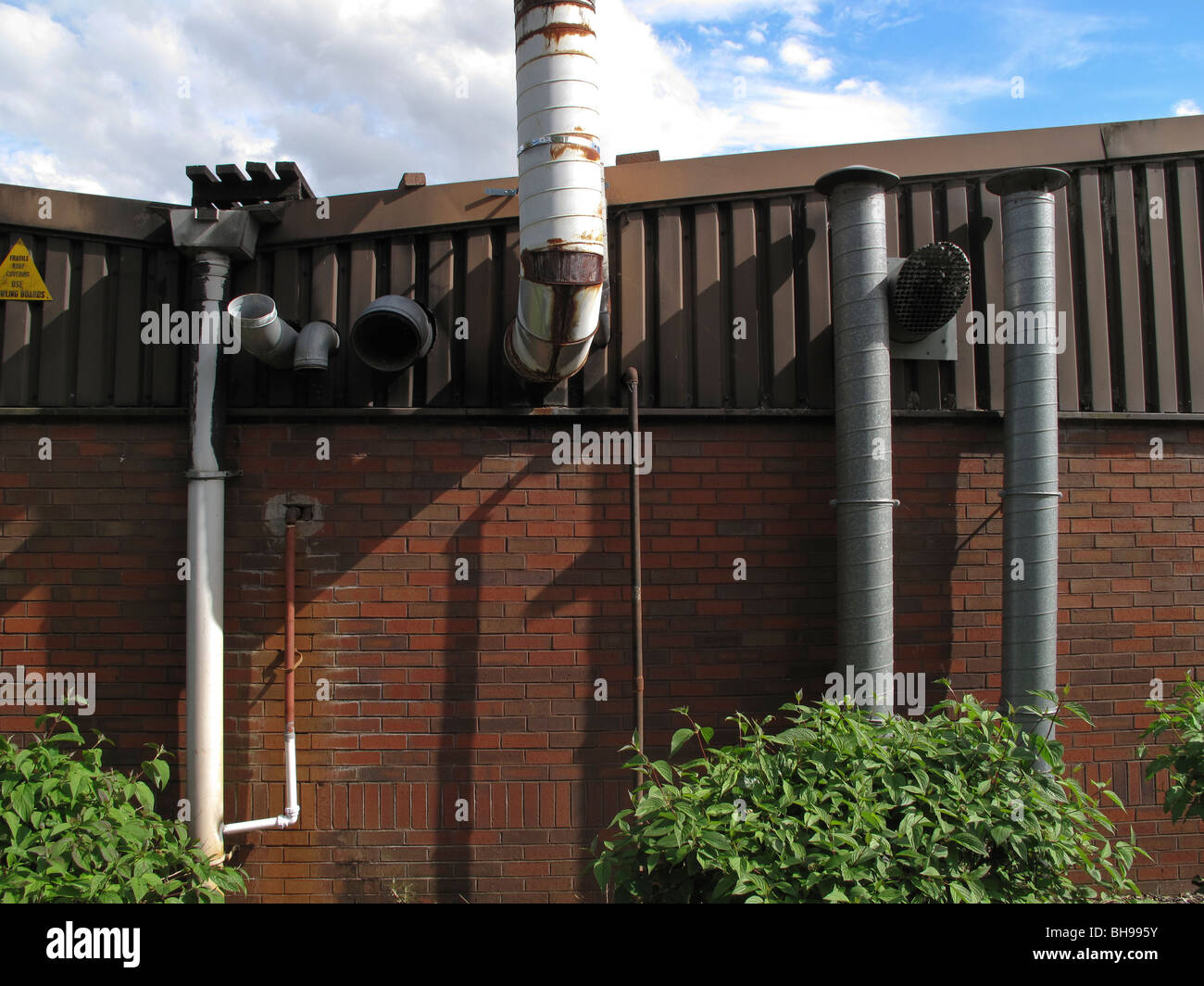 vents and flues on factory unit Stock Photo - Alamy
