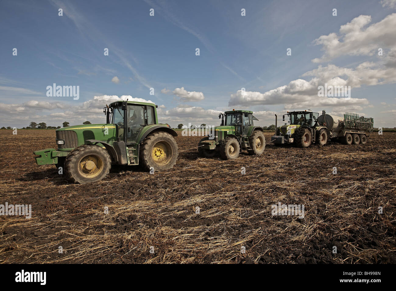 Three tractors working the land, Arglam, East Yorkshire, UK. Tractor in ...