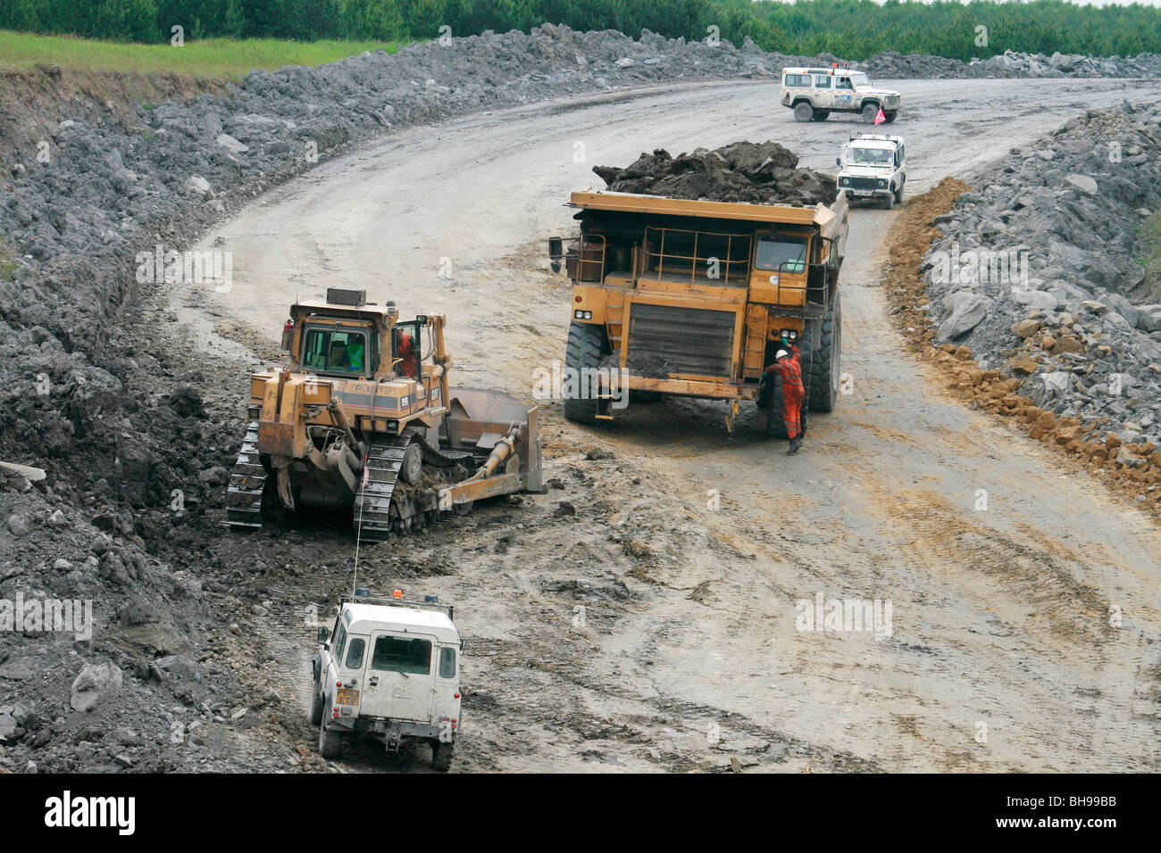 Vehicles working in quarry in hi-res stock photography and images - Alamy