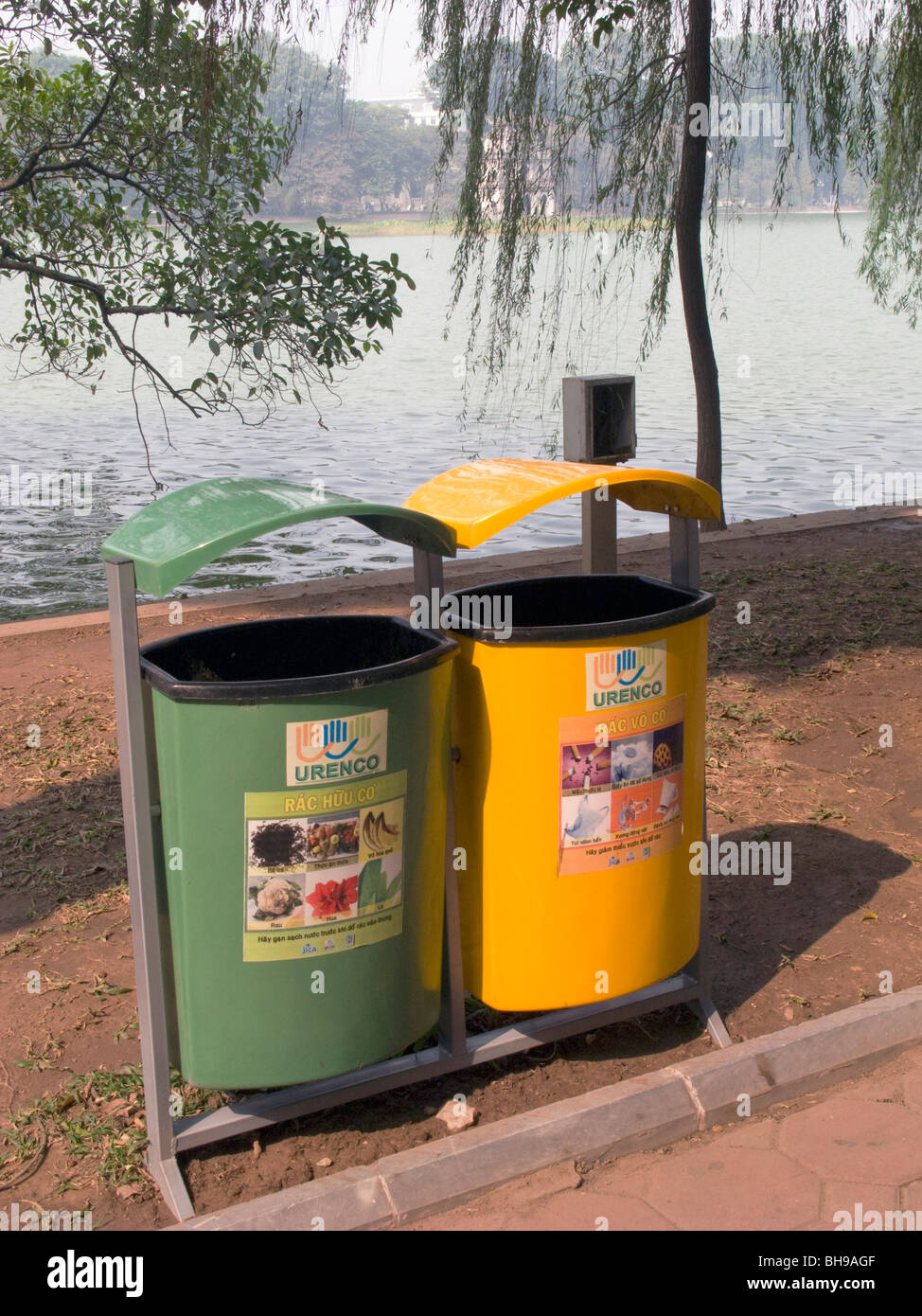 VIETNAM RECYCLING BINS BY A LAKE IN HANOI Photo © Julio Etchart Stock ...
