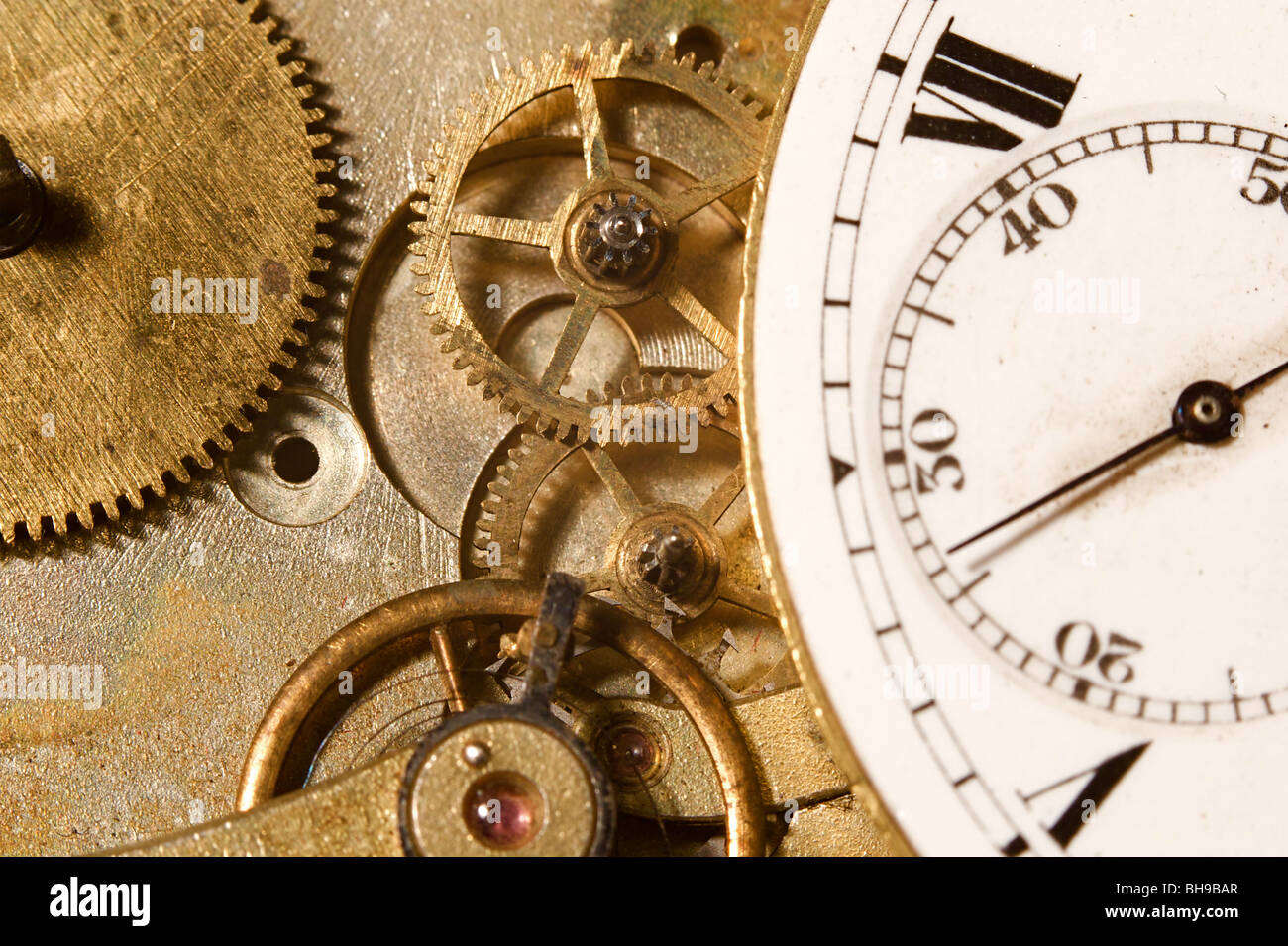 Closeup of the gears and teeth of a pocket watch Stock Photo - Alamy