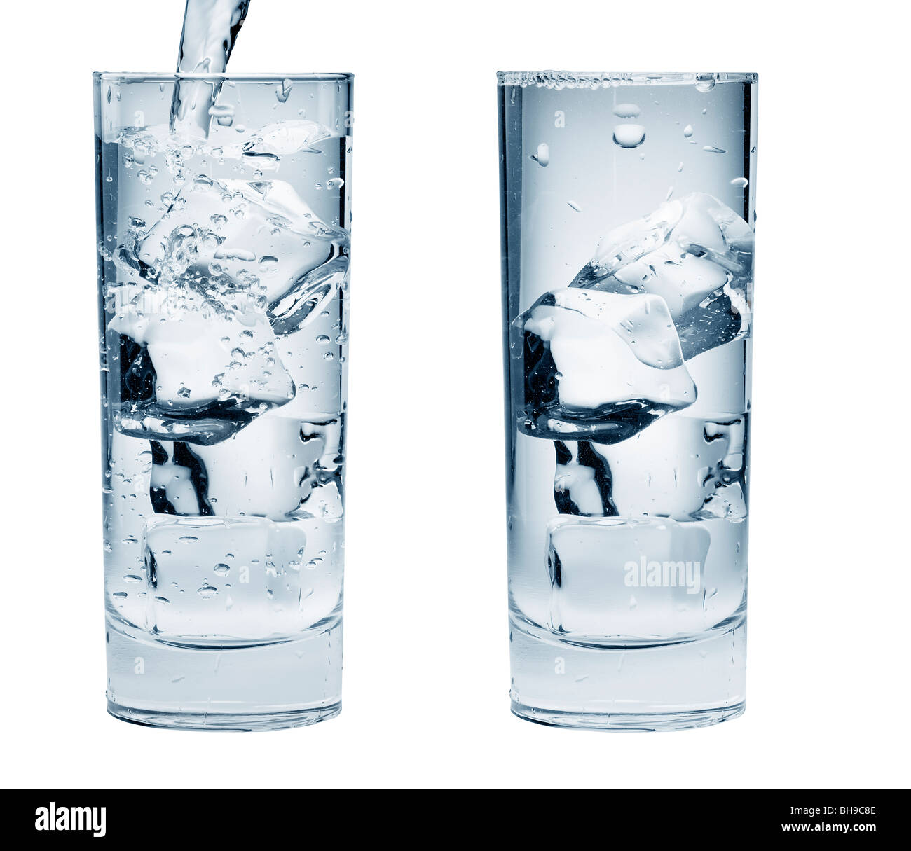 Two glasses with flowing mineral water, bubbles and transparent ice cubes Stock Photo - Alamy