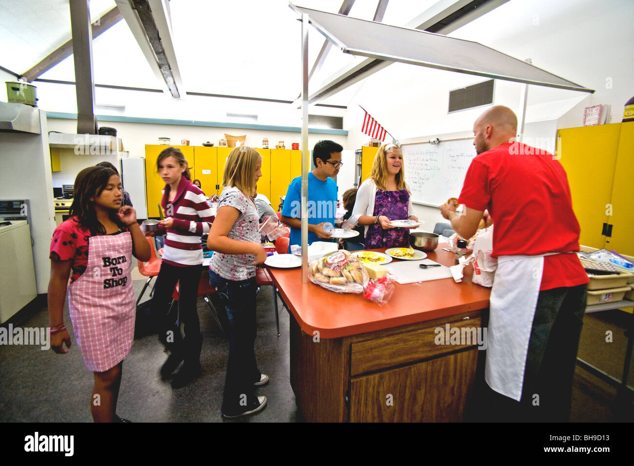Boys and girls at a Southern California middle school collect ...