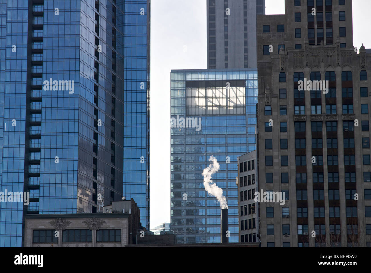 Highrise buildings and smokestack, Chicago Stock Photo - Alamy