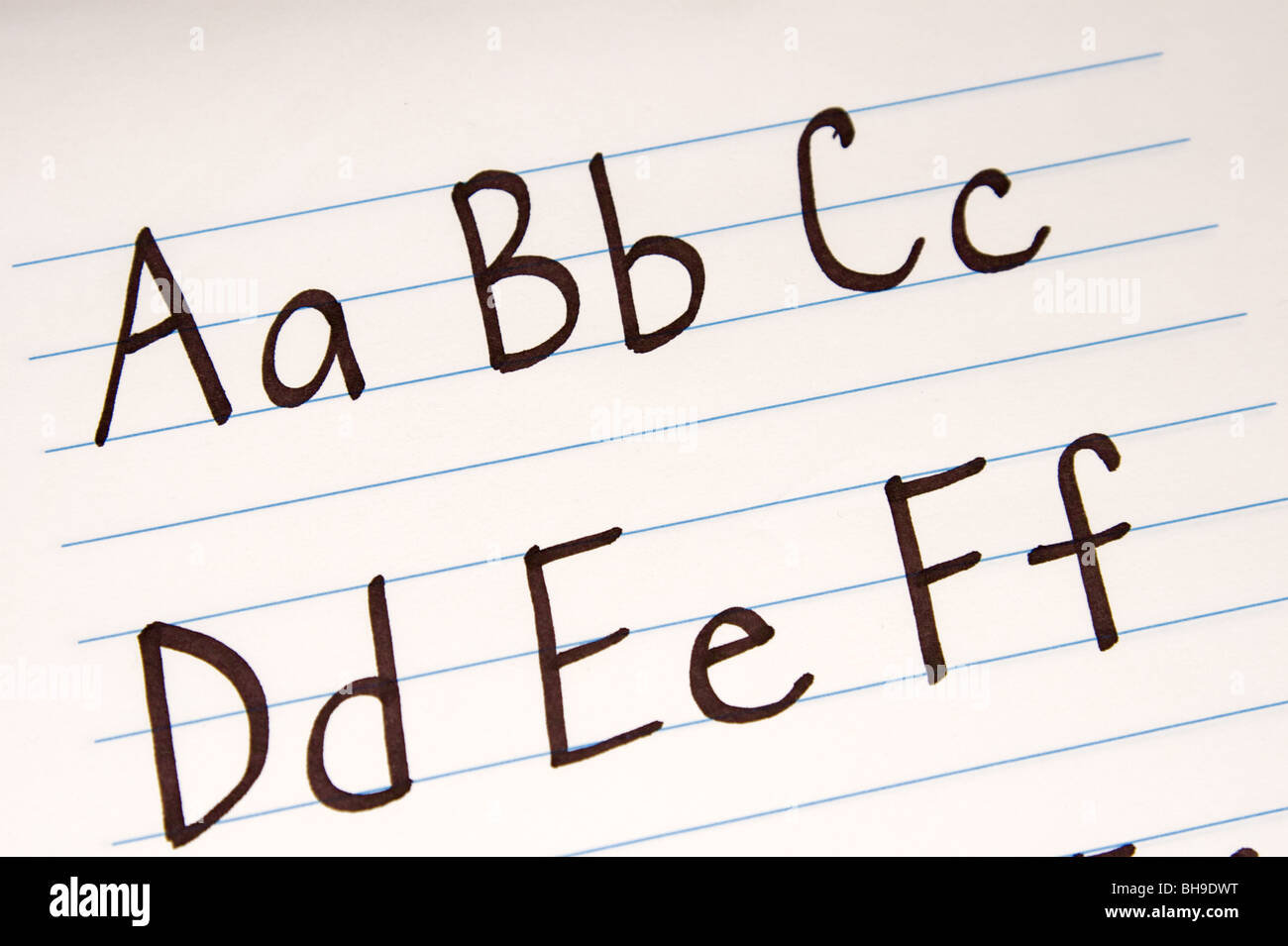 Written letter of the alphabet for students Stock Photo - Alamy