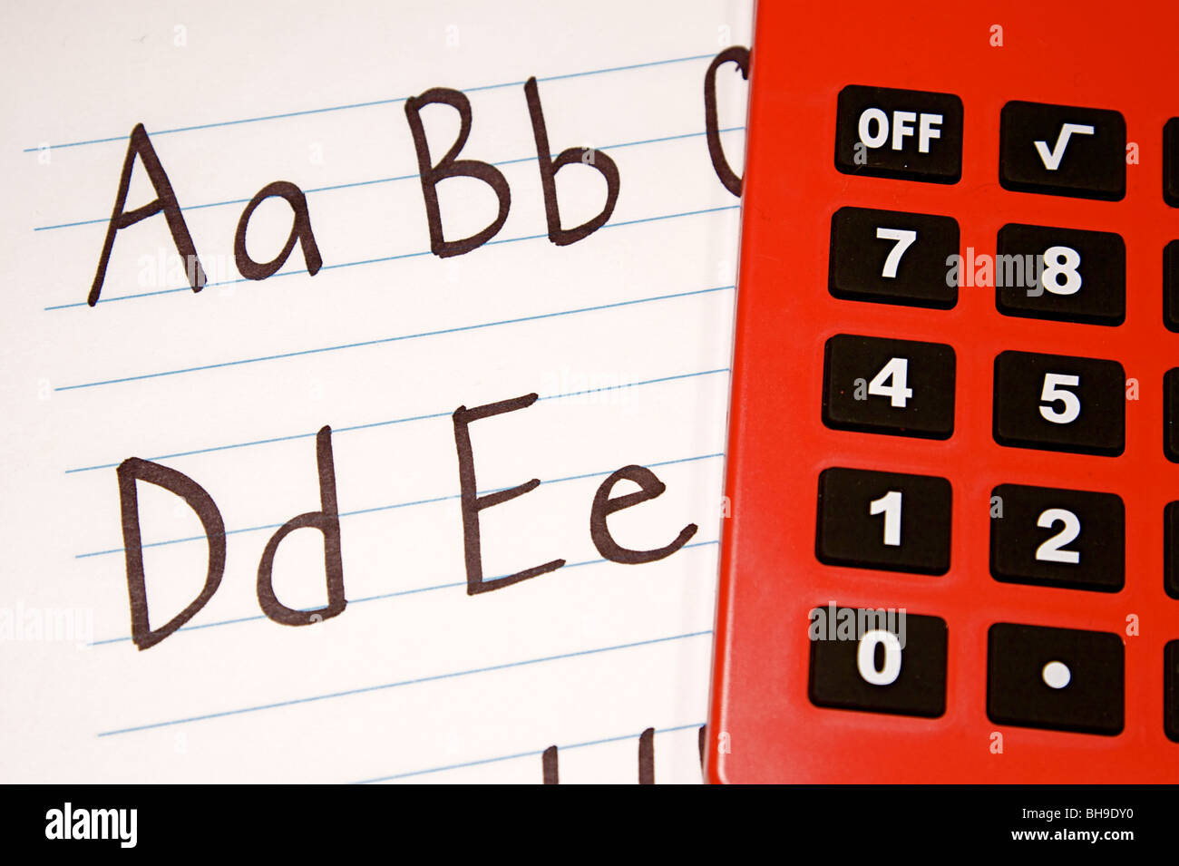 Students desktop lesson plan and calculator Stock Photo - Alamy