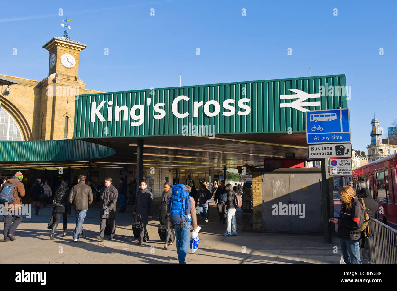 Exterior view of entrance to King's Cross Station from pavement with ...