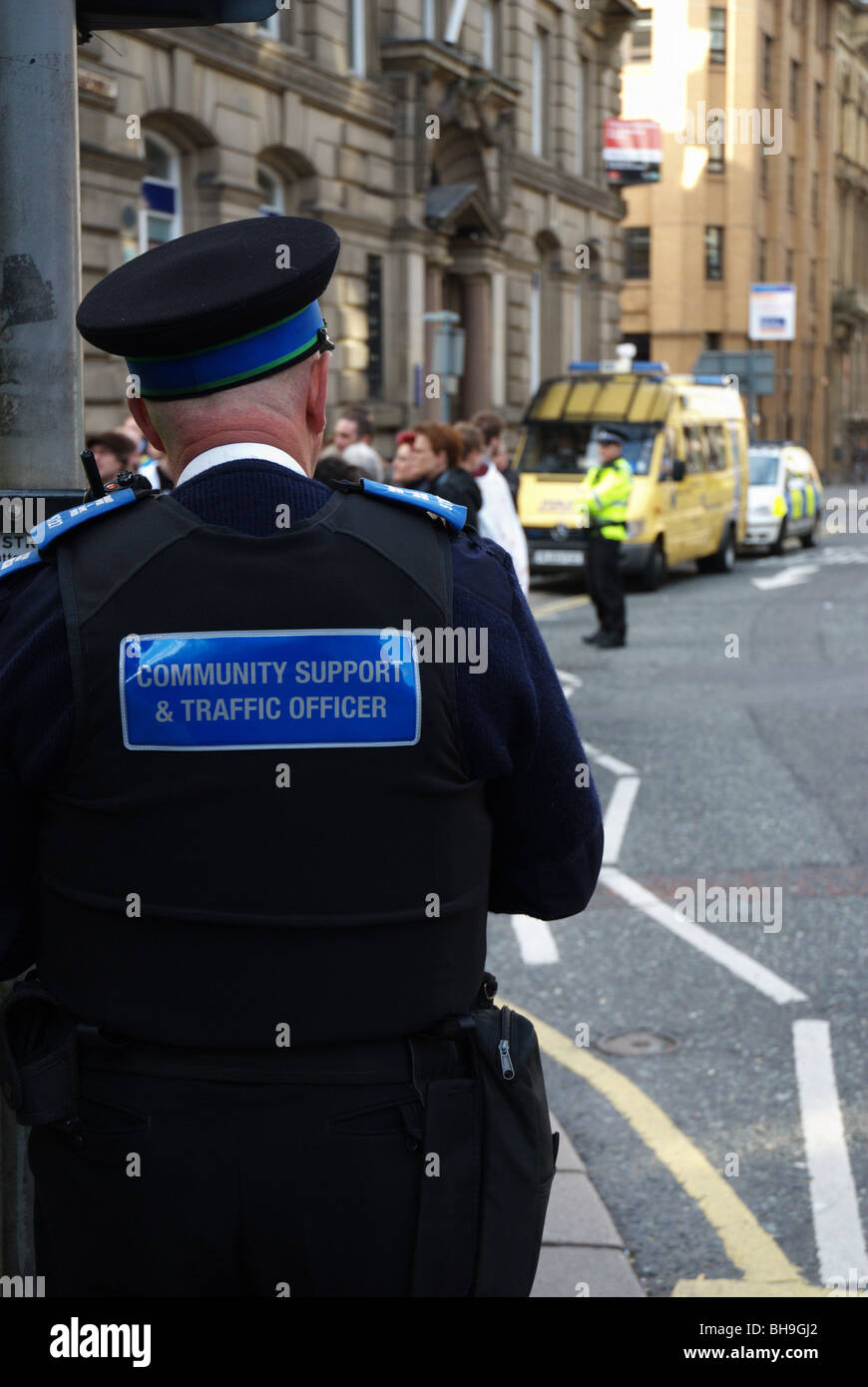 Police Community Support Officer (PCSO) patrolling a political ...