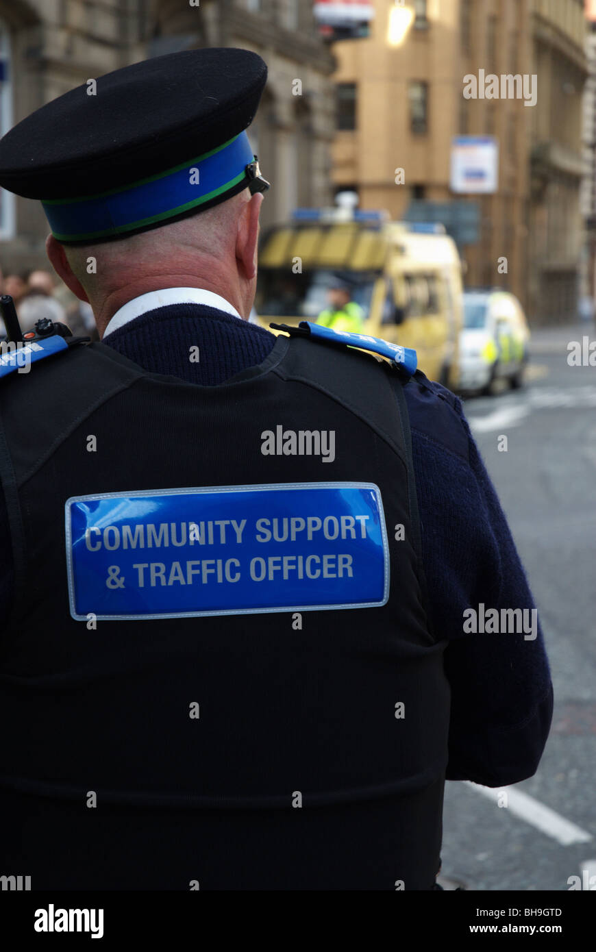 Police Community Support Officer (PCSO) patrolling a poitical ...