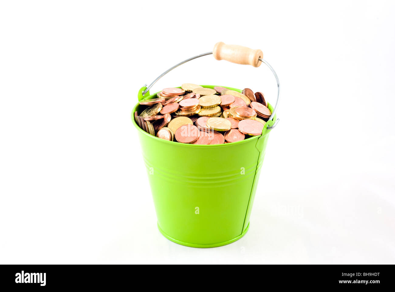 Euro coins in a green bucket isolated on white background Stock Photo ...