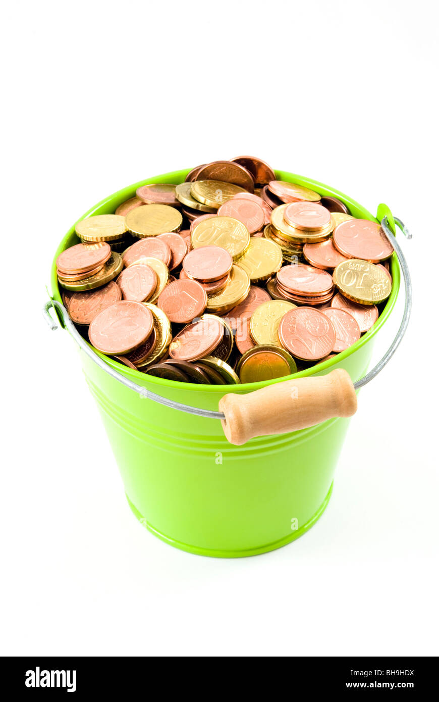 Euro coins in a green bucket isolated on white background Stock Photo ...