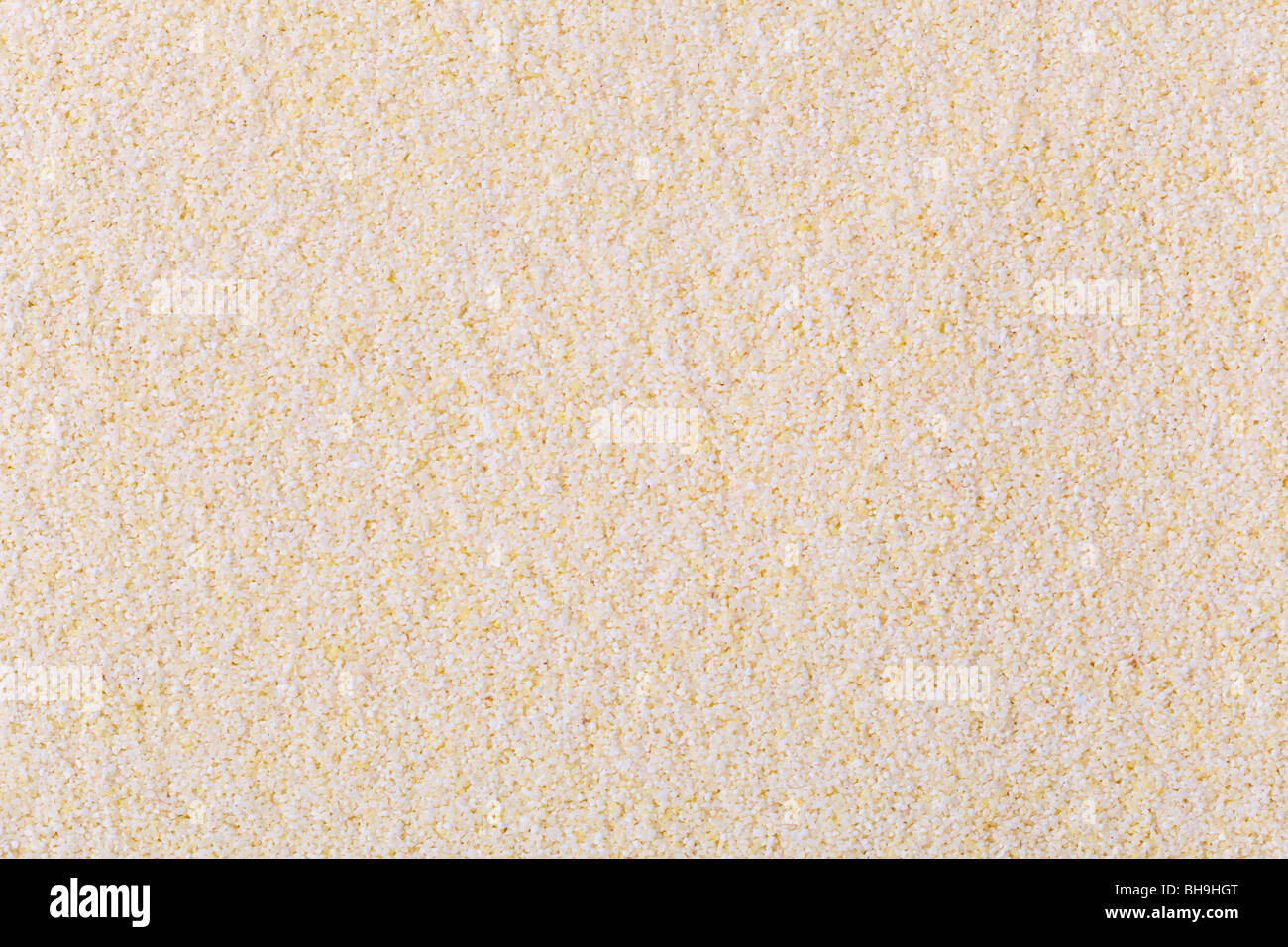 The surface of yellow sand - art background Stock Photo - Alamy