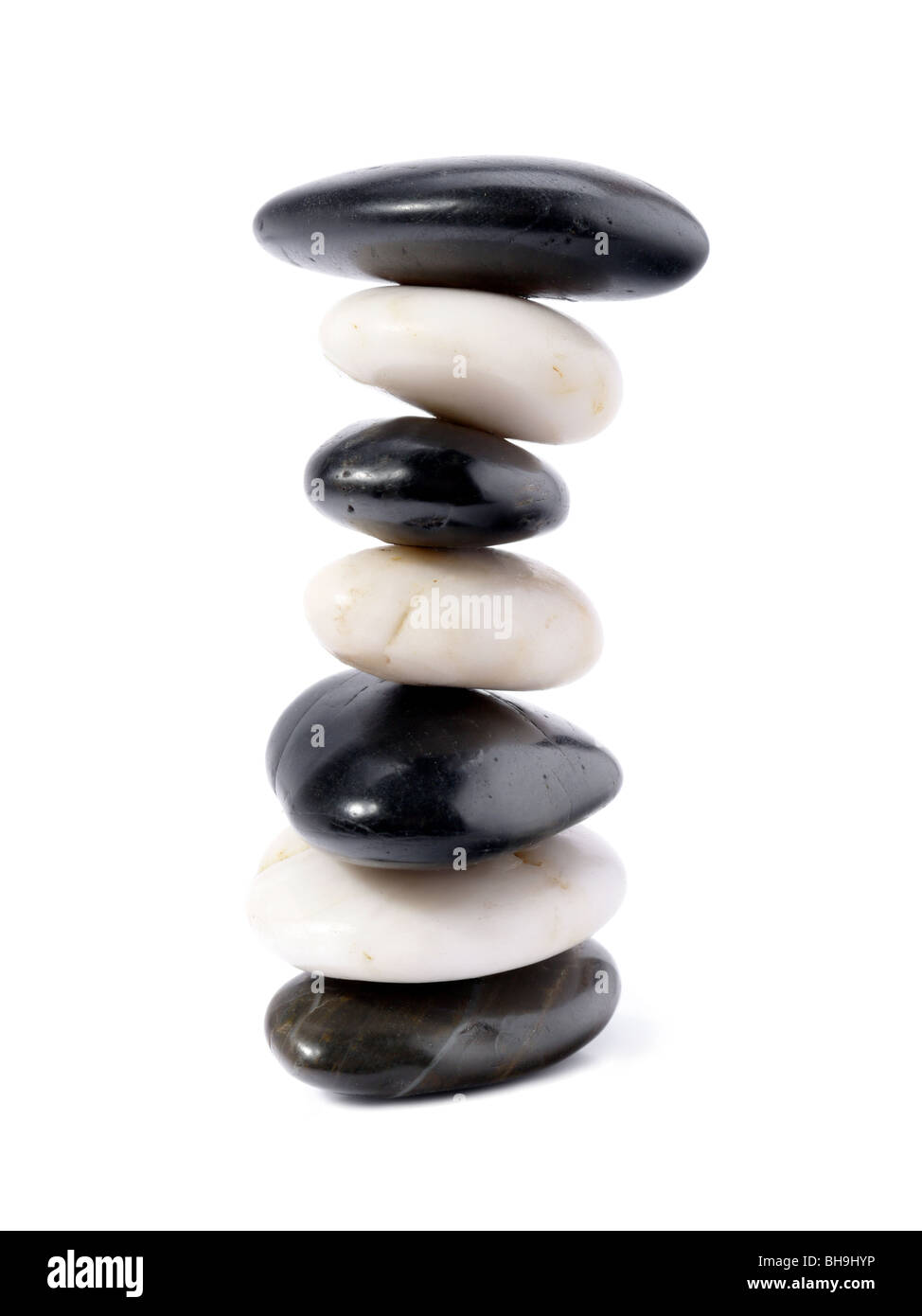 Black and white stones stacked over white background Stock Photo - Alamy