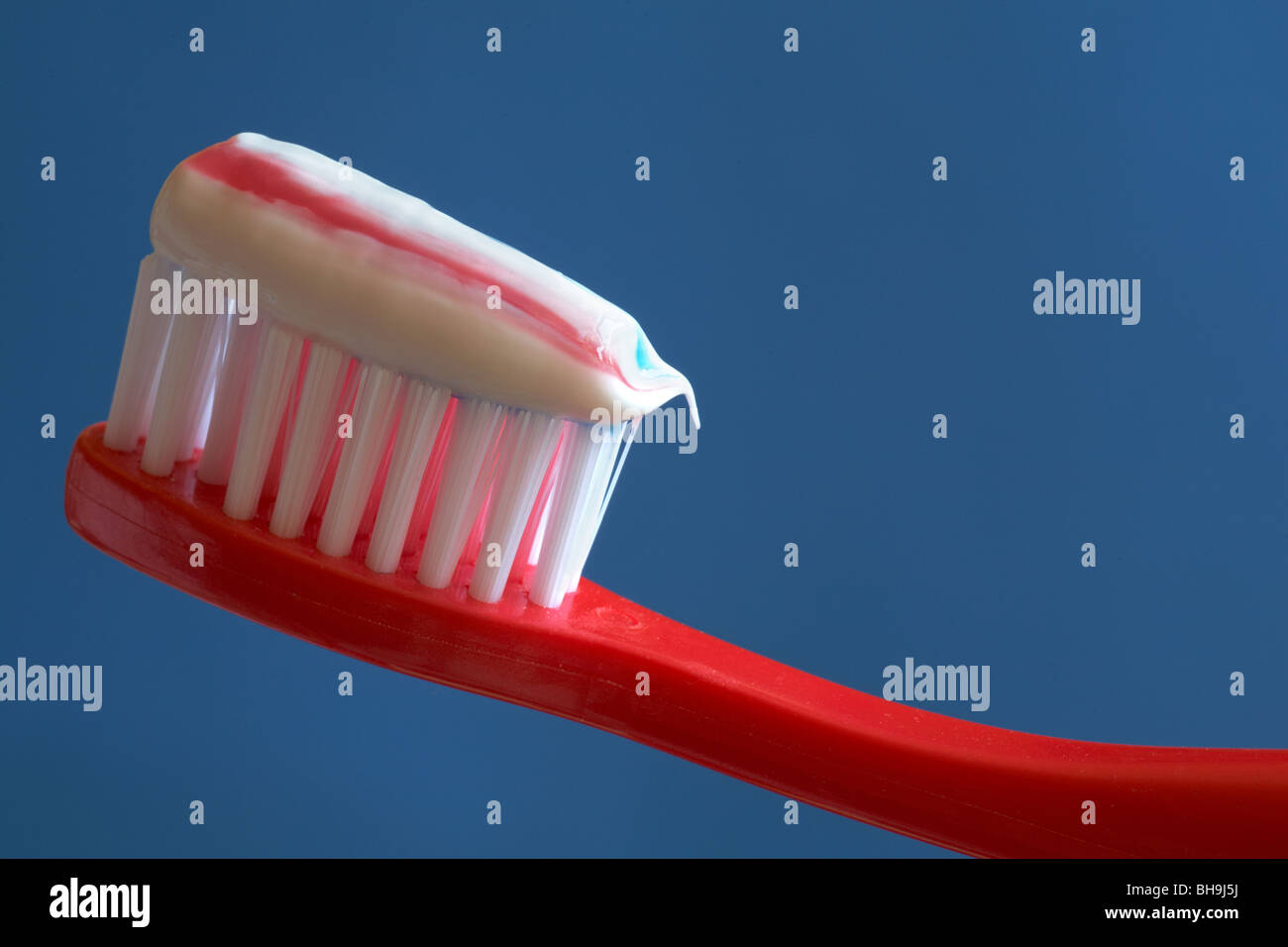 Red toothbrush head bristles against hi-res stock photography and ...