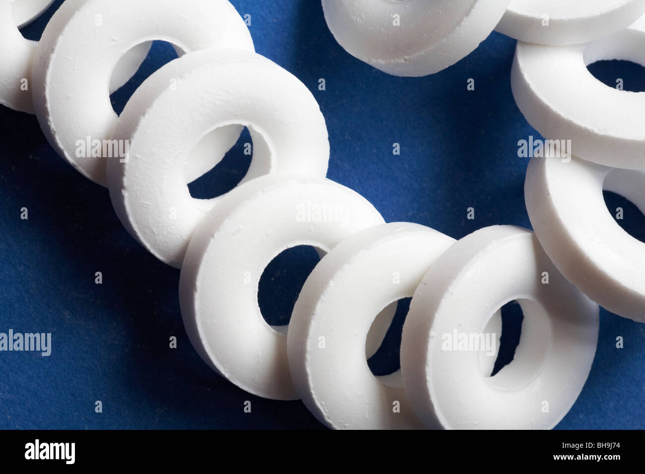 white polo mints set against blue background - sweets candies polo mint ...