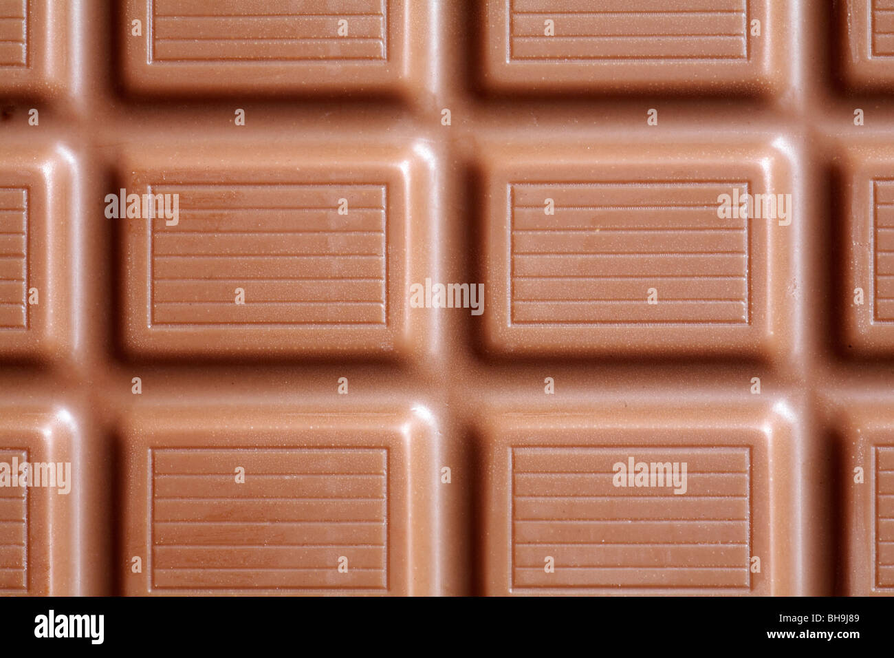 close up of organic Swiss milk chocolate bar - chocolate squares Stock ...