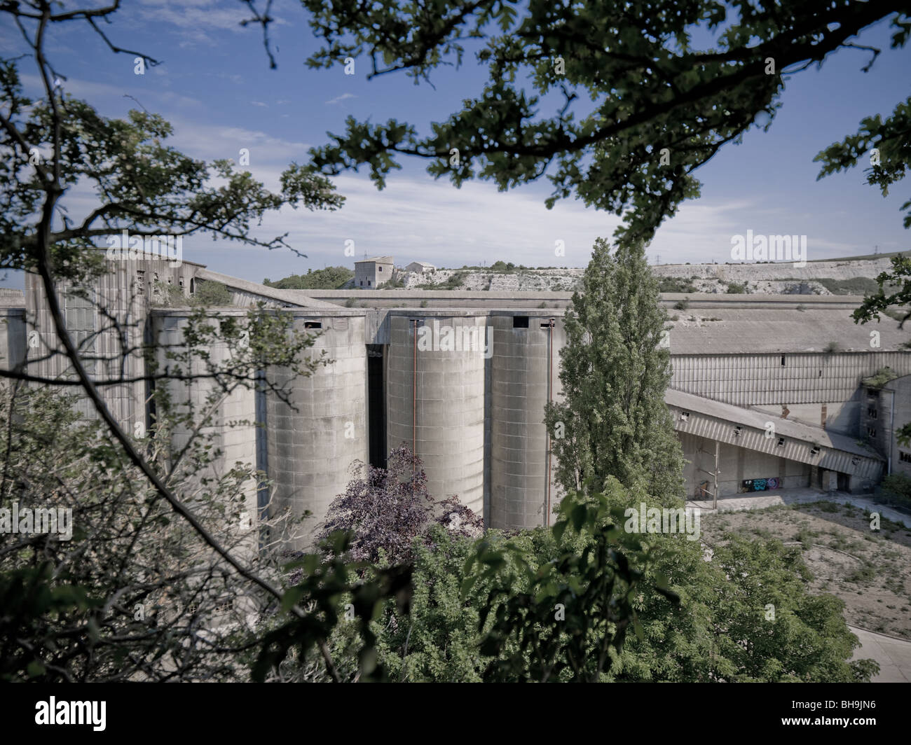 closed down cement works, abandoned industrial building Stock Photo - Alamy