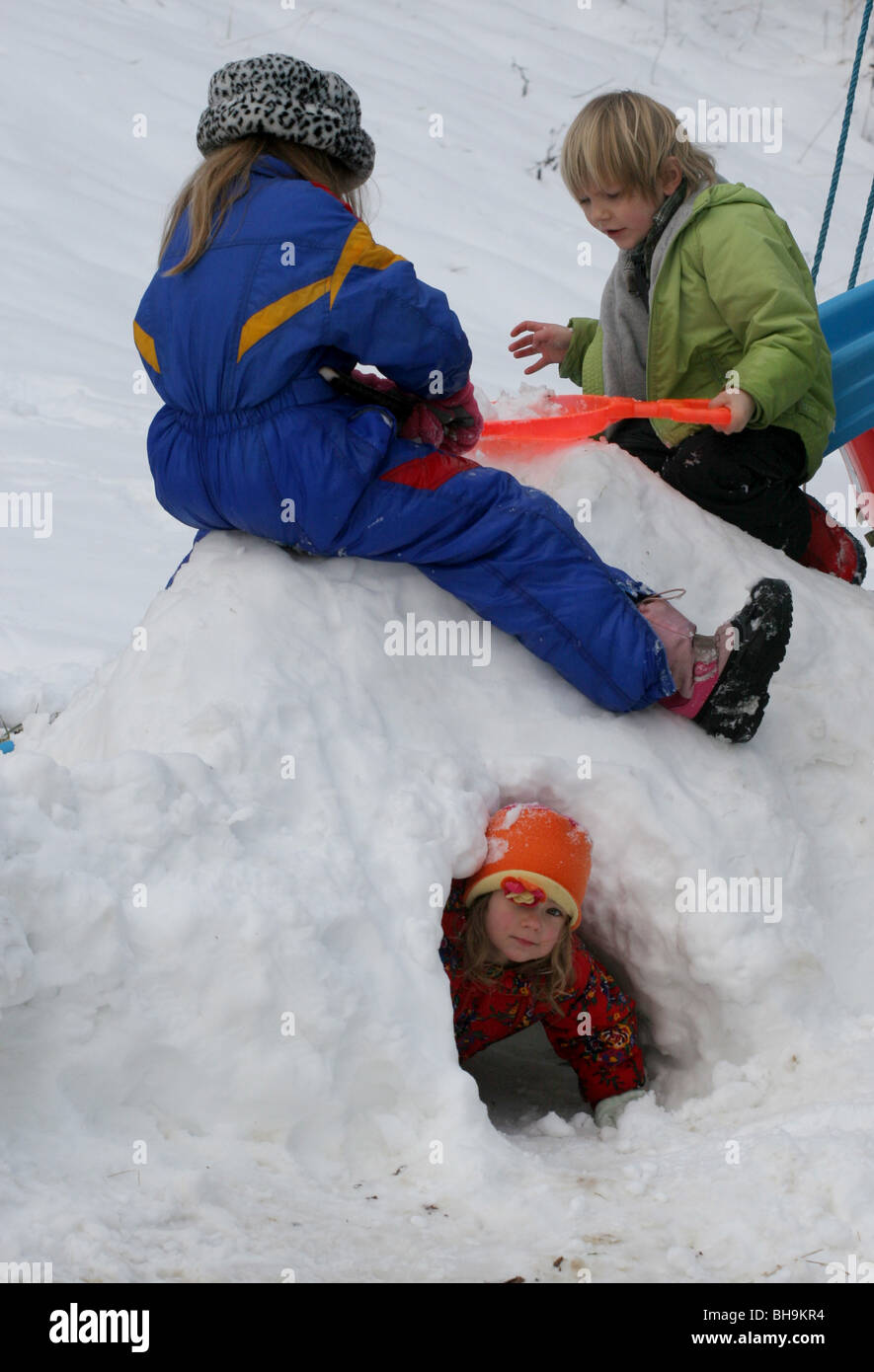 Children building igloo hi-res stock photography and images - Alamy
