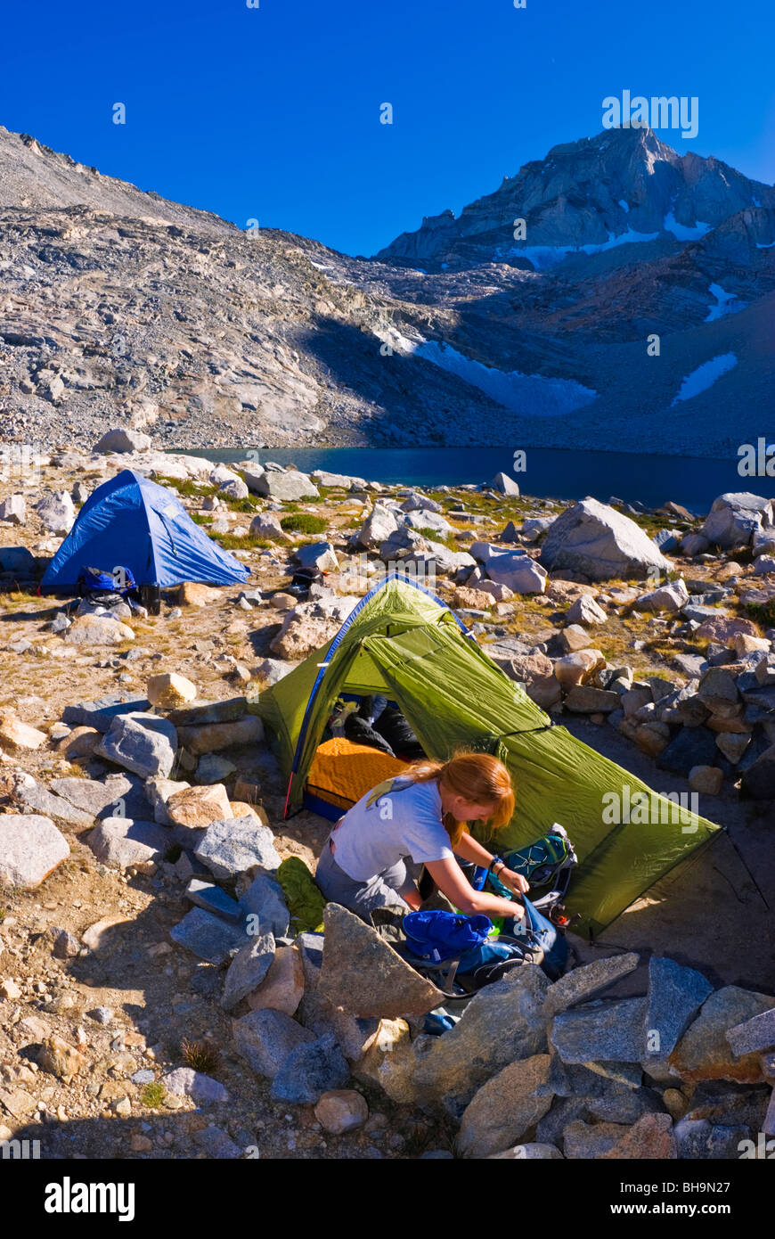 Climber in camp at Dade Lake under Bear Creek Spire, John Muir ...