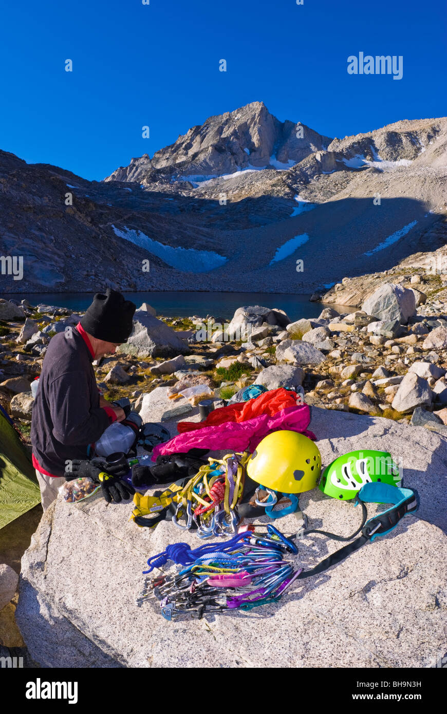Climber in camp at Dade Lake under Bear Creek Spire, John Muir ...