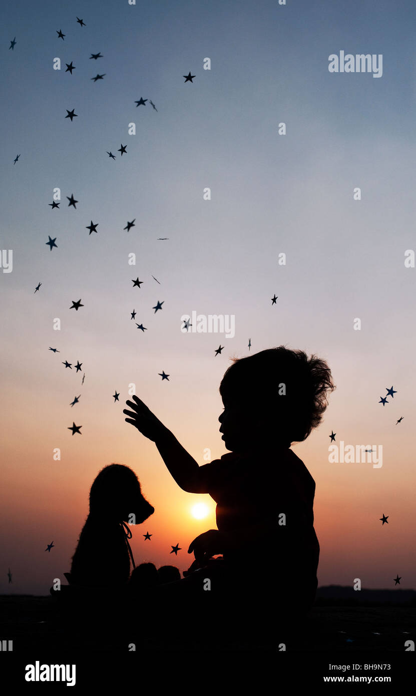 Boy catching stars hi-res stock photography and images - Alamy