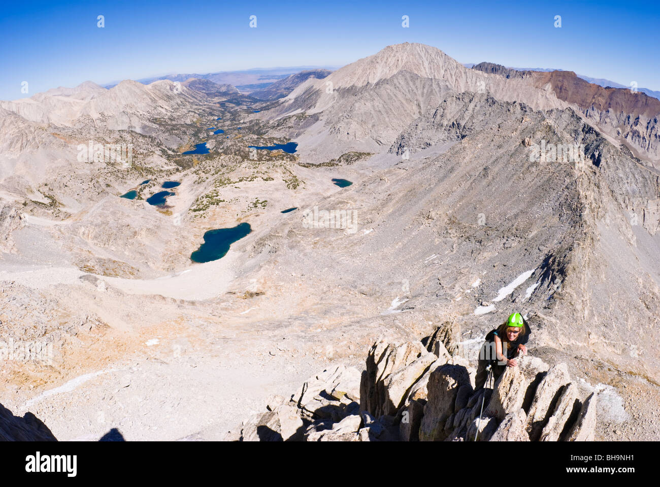 Climber on the northeast ridge of Bear Creek Spire, John Muir ...