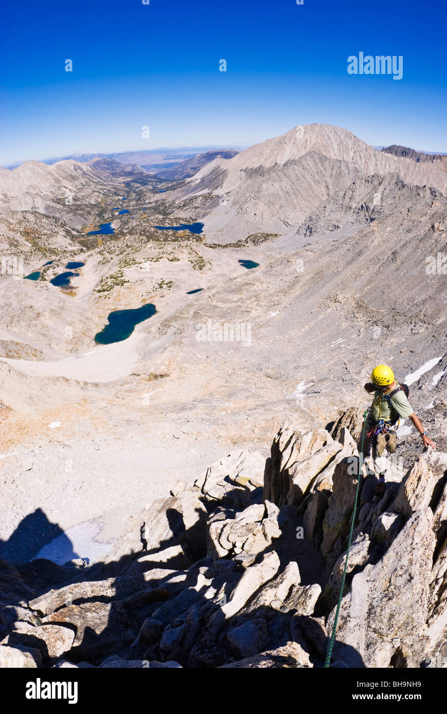Climber on the northeast ridge of Bear Creek Spire, John Muir ...