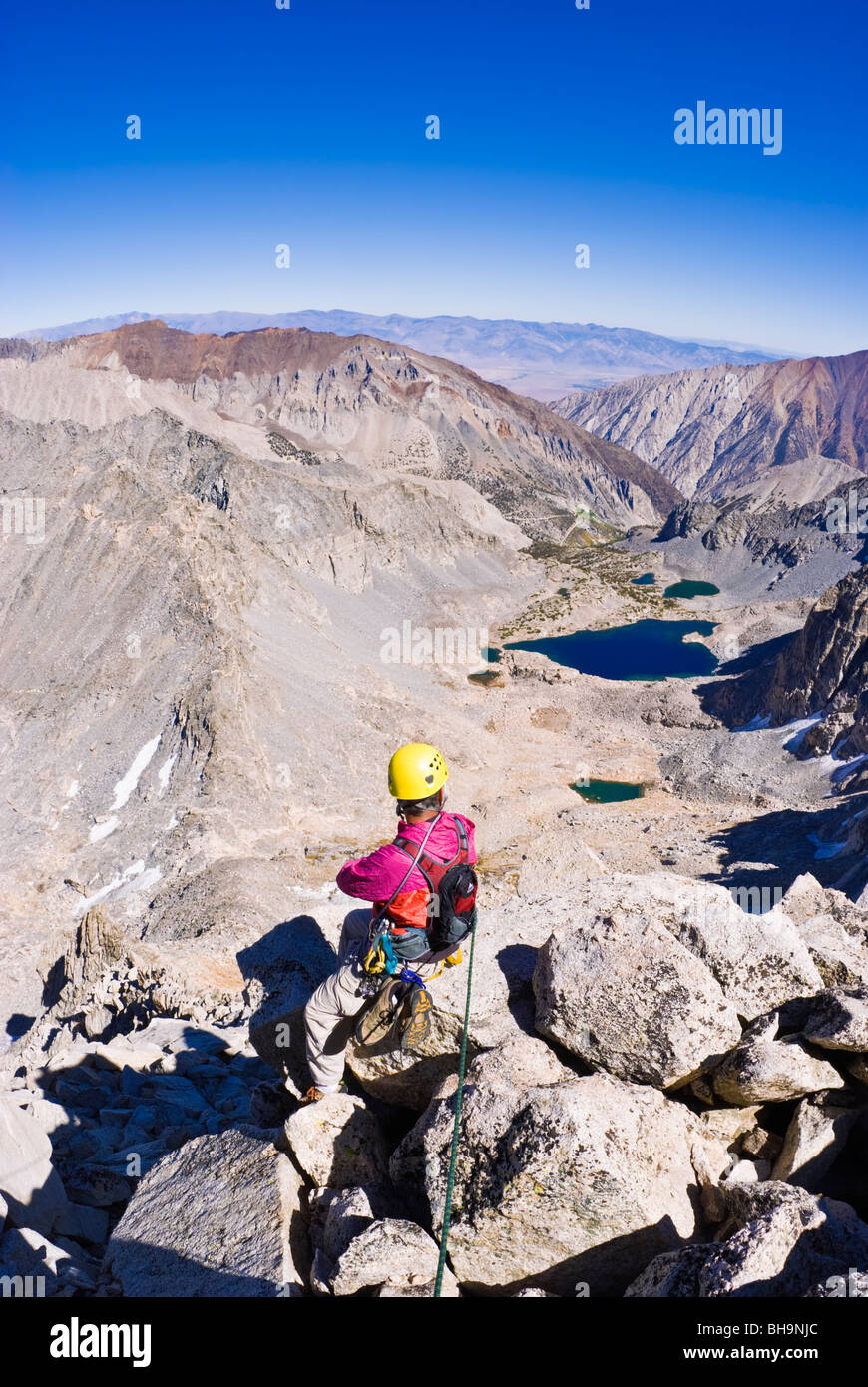Climber on the northeast ridge of Bear Creek Spire, John Muir ...