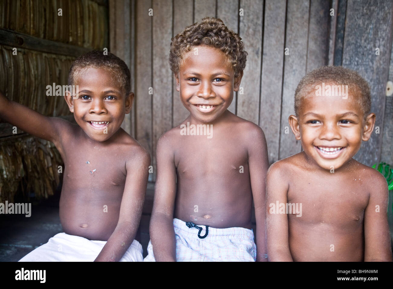 Three young children pose smiling for the camera Santa Ana Island ...